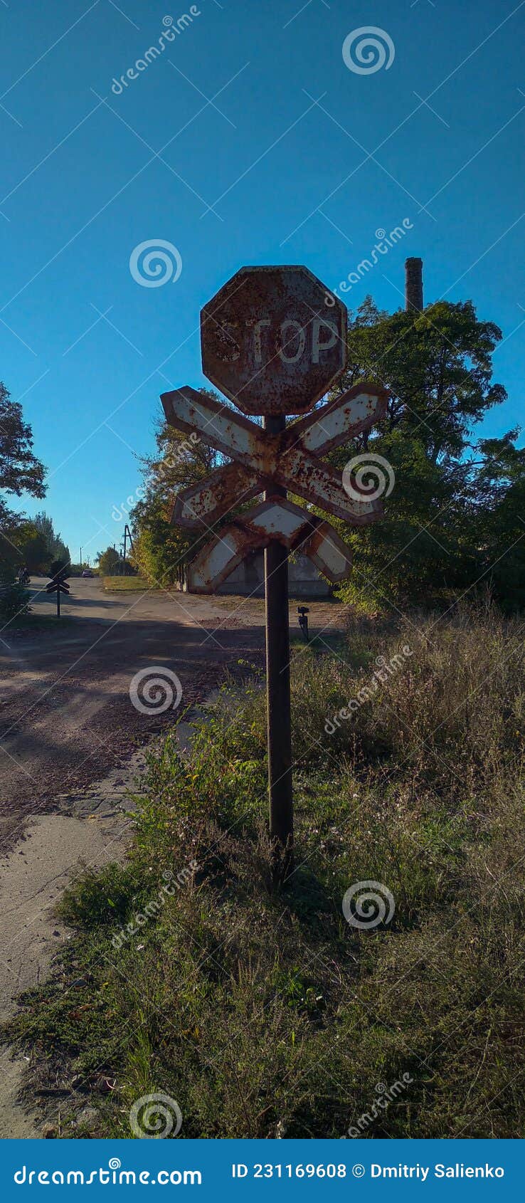 Rusted Ol Road Signs With Background Vegetation. Royalty-Free Stock ...