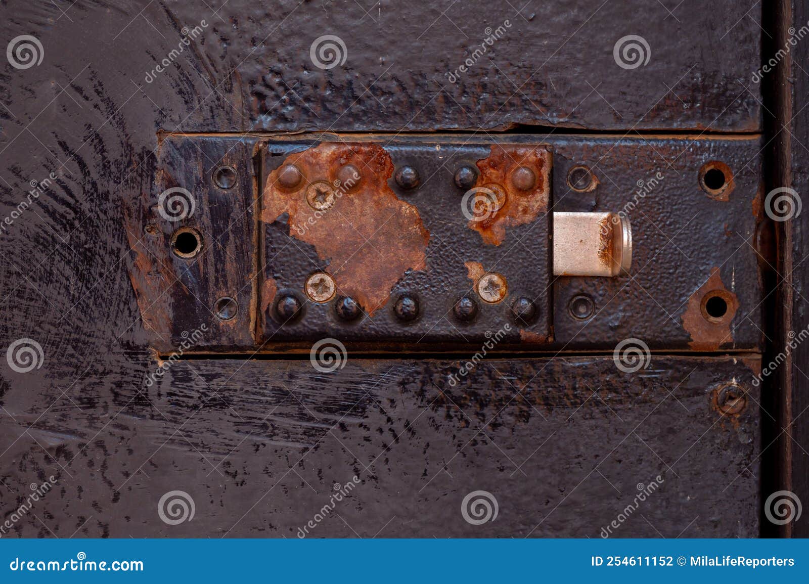 Old Rusted Technical Hatch With A Manual Lock, Latch. Red Rust Spots On ...