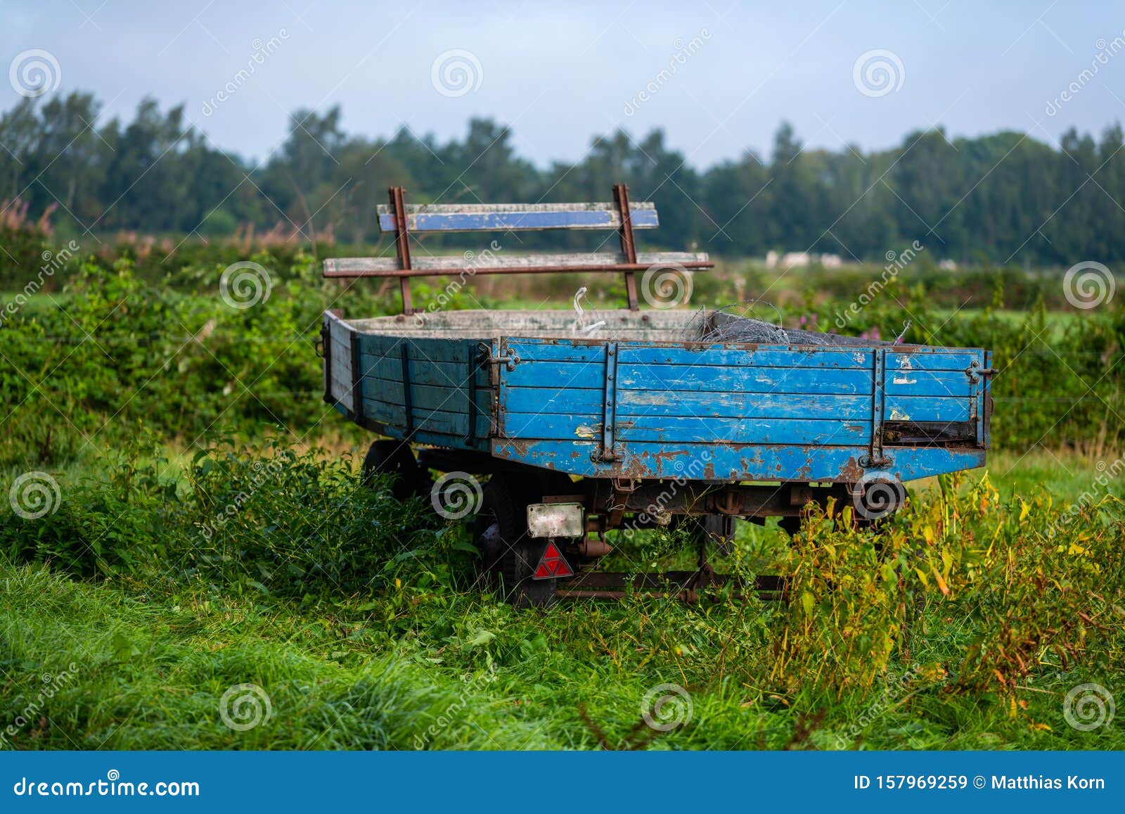 An Old Rusted Trailer Stands on a Field Stock Image - Image of ...