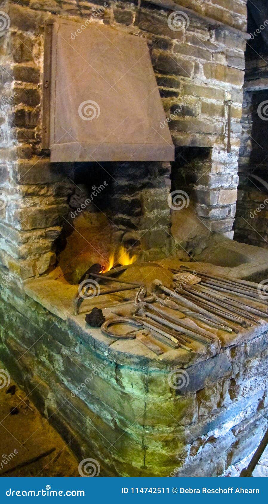 Blacksmith In Forge - Sharpening Iron Tools With Sparkles - Metal ...
