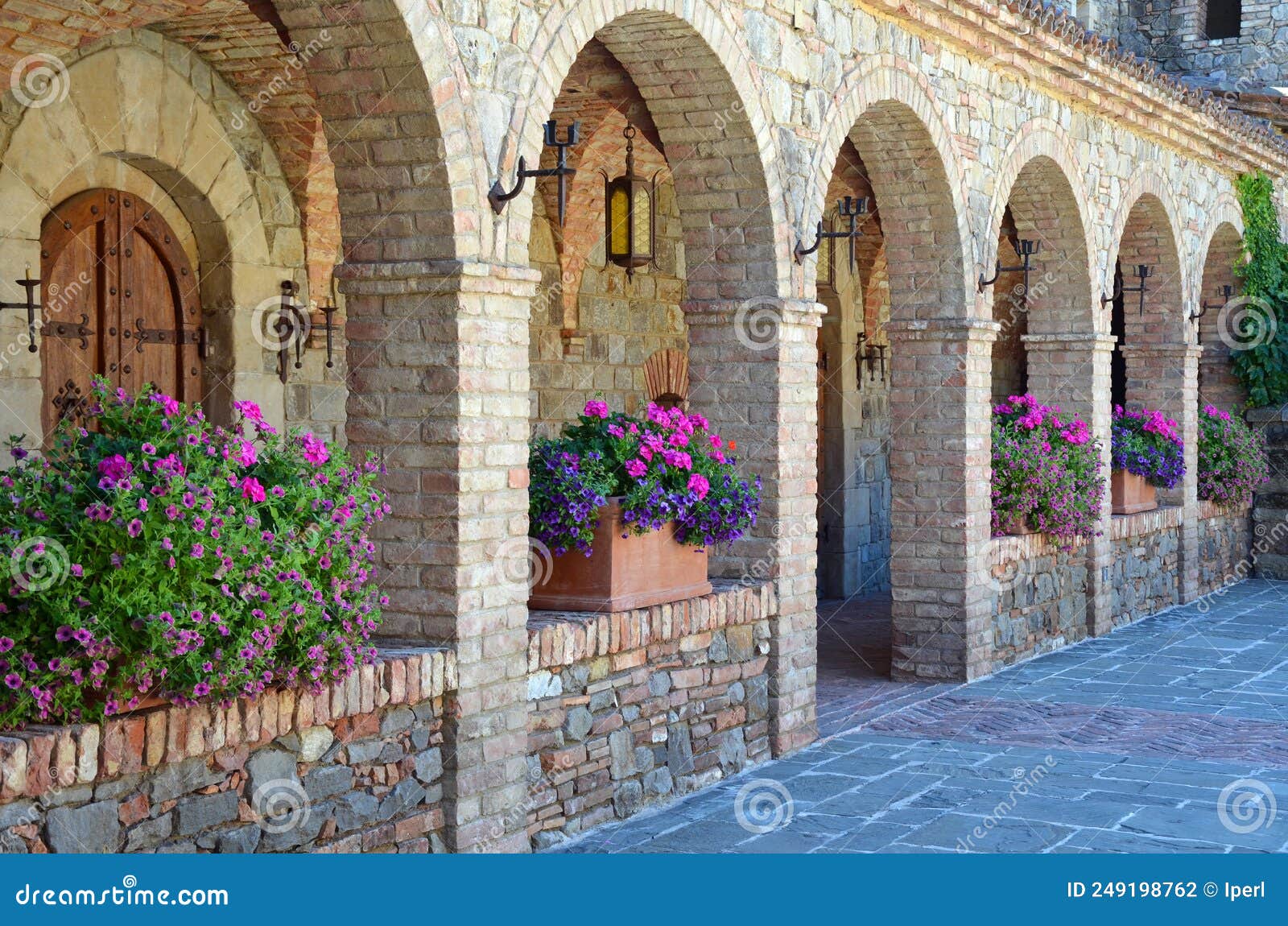 Old rustic brick courtyard stock photo. Image of brick - 249198762
