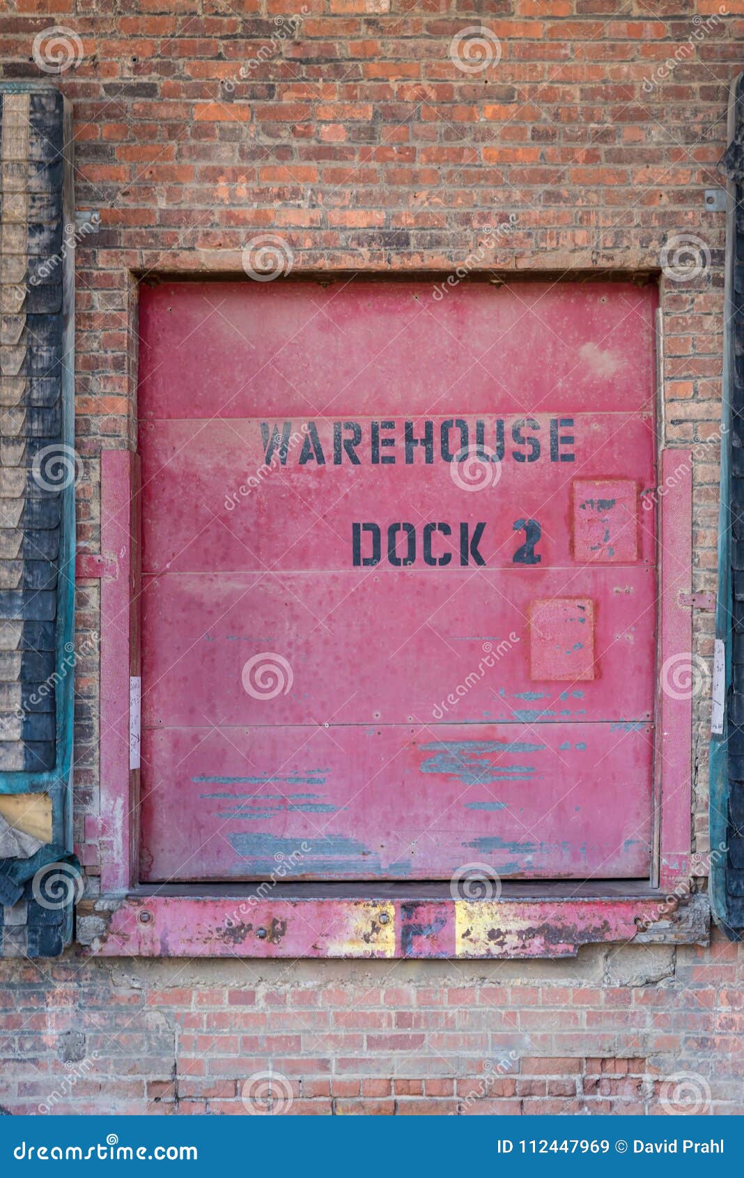 Closeup of Old Red Warehouse Dock Door on Brick Wall Stock Image ...