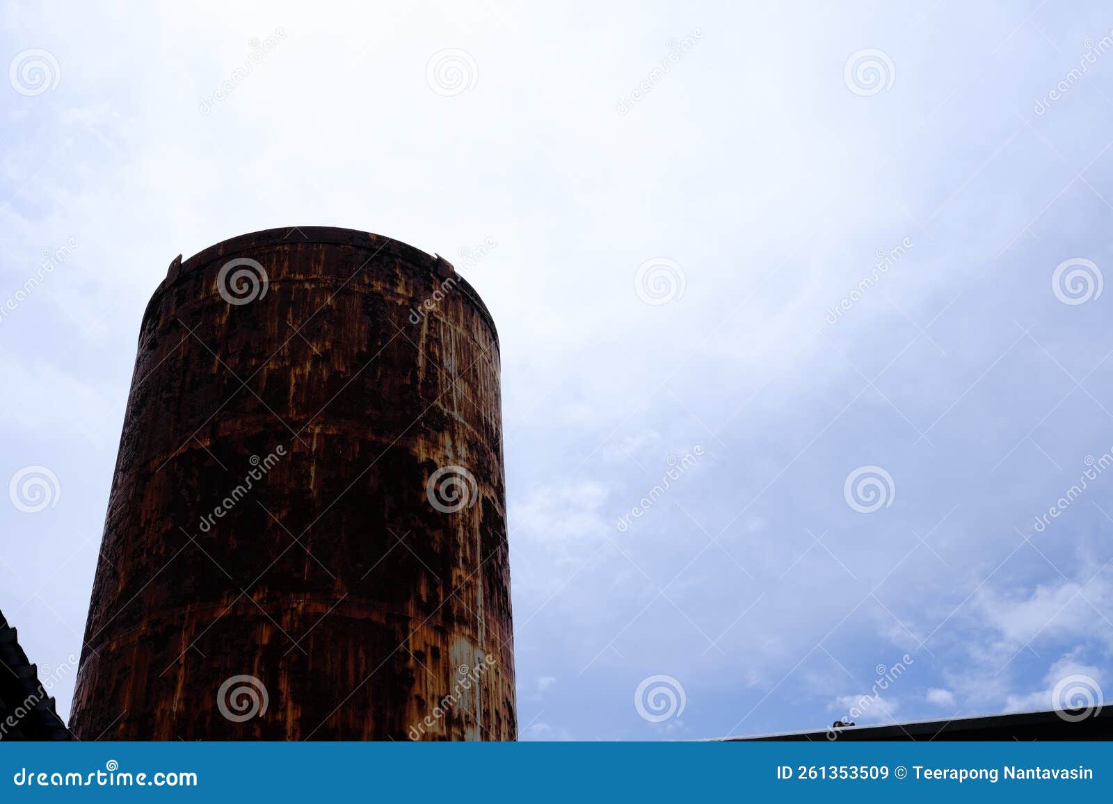 Old Rustic Water Tank with Cloudy Sky Background. Stock Image - Image ...