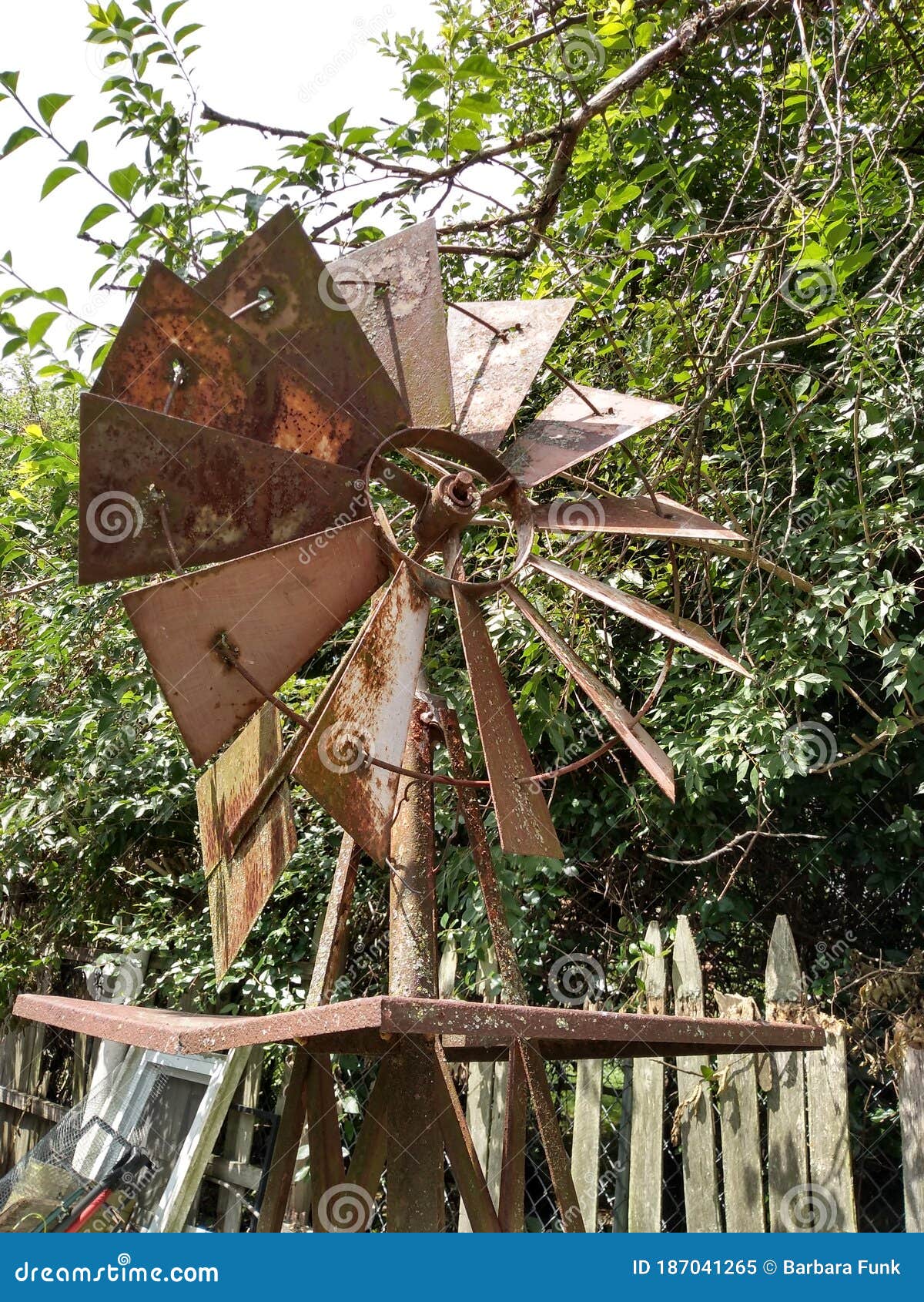 Old Rustic Windmill Fan stock image. Image of tree, trunk - 187041265