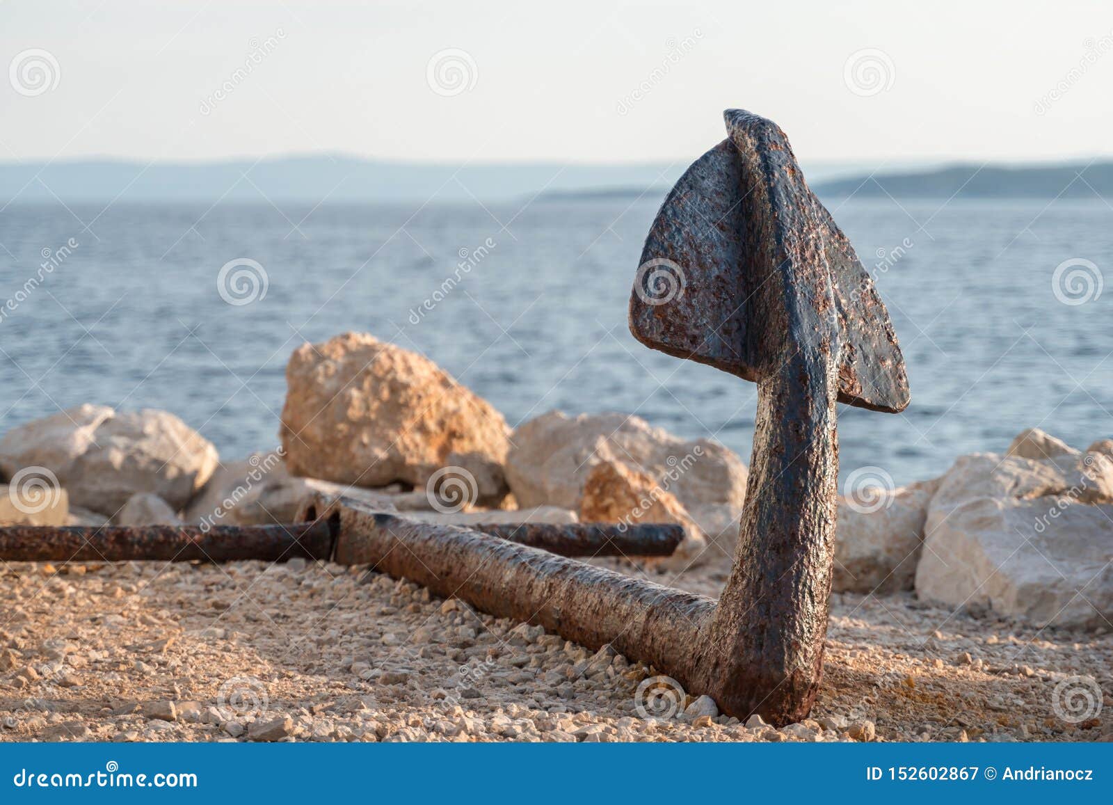 Old Rusty Anchor on the Beach with Stones Stock Image - Image of rust ...