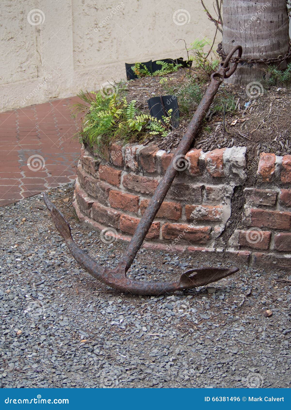 Old Rusty Anchor Leaning on a Brick Wall Stock Photo - Image of virgin ...