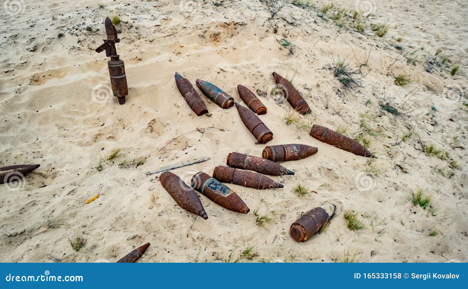 Old bombs in desert stock photo. Image of projectile - 165333158