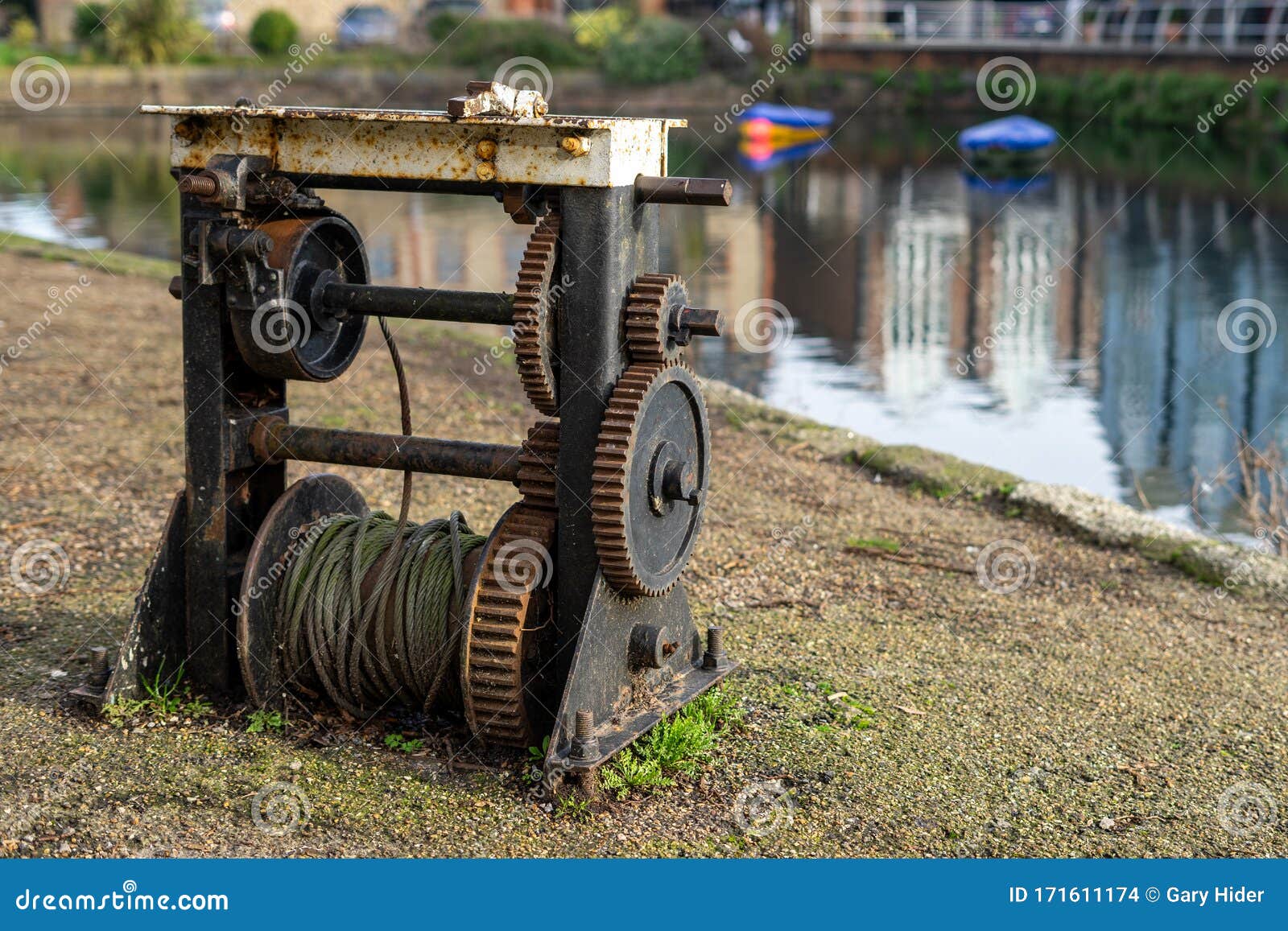 An Old Rusty Barge Winch Next To a Canal Used As Part of an Old Canal ...