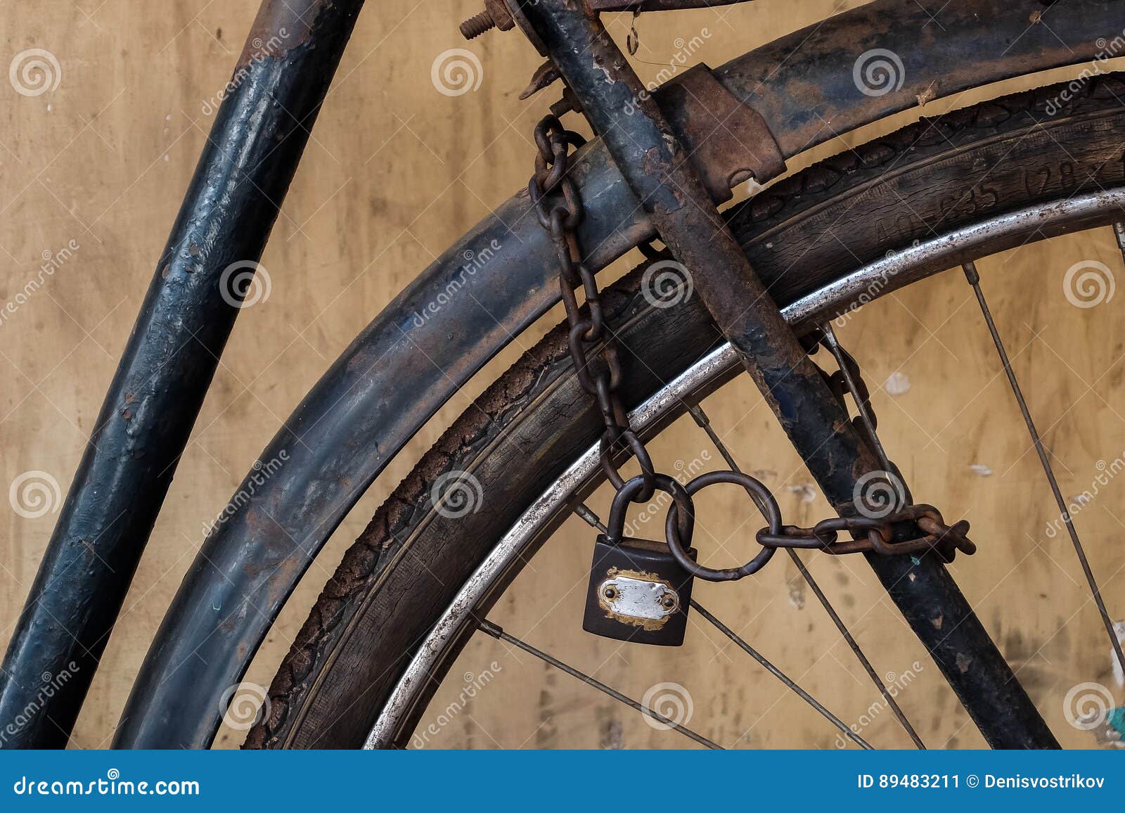 Old Rusty Bicycle with Chain and Lock on the Wheel Stock Image - Image ...