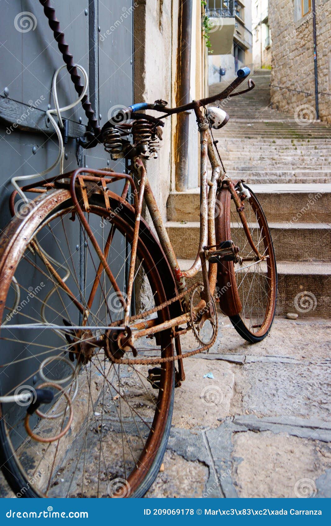 Old Rusty Bike on the Street Stock Photo - Image of door, stairs: 209069178