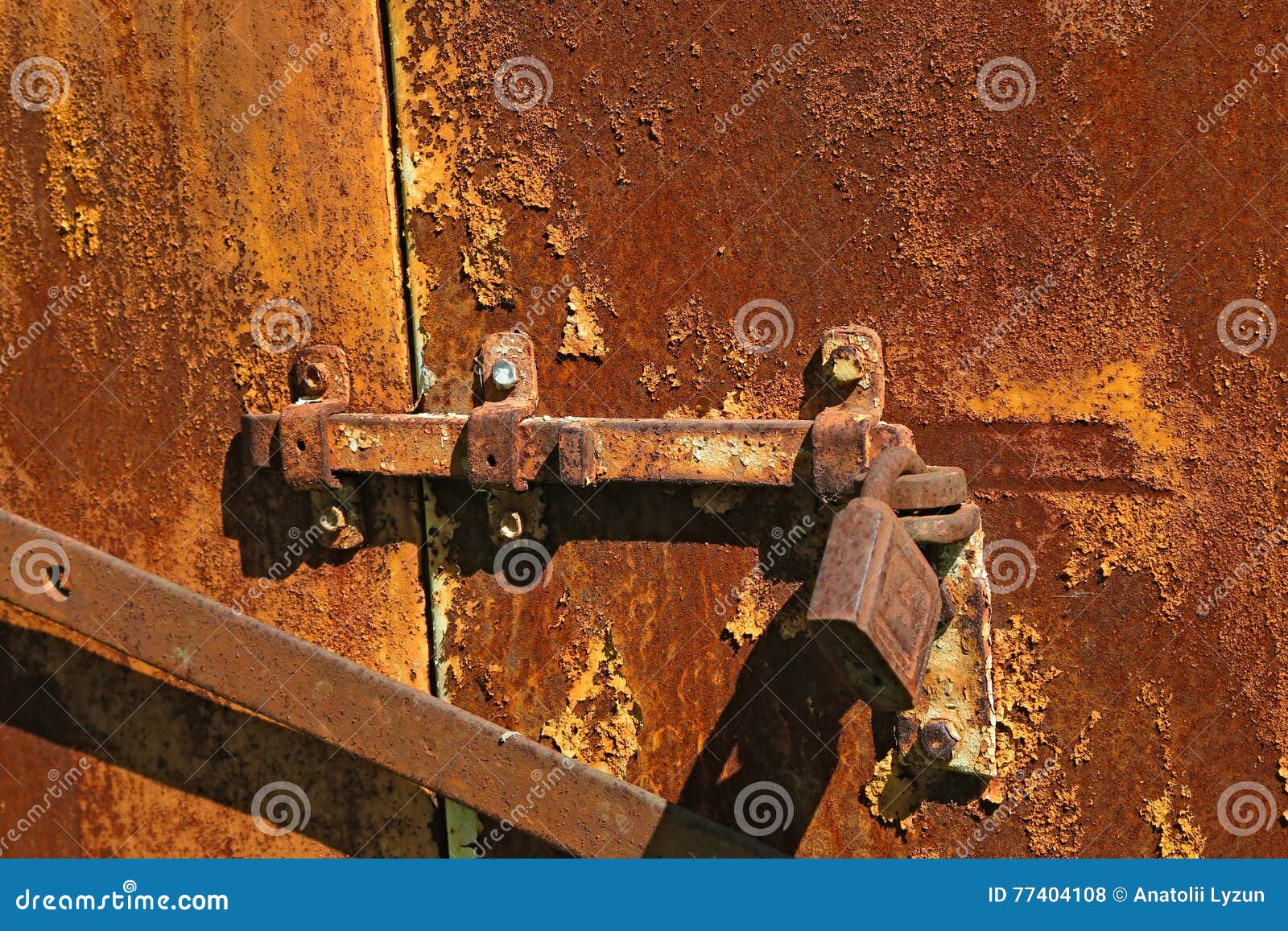 Old Rusty Bolt with a Lock on Iron Gate Stock Photo - Image of iron ...