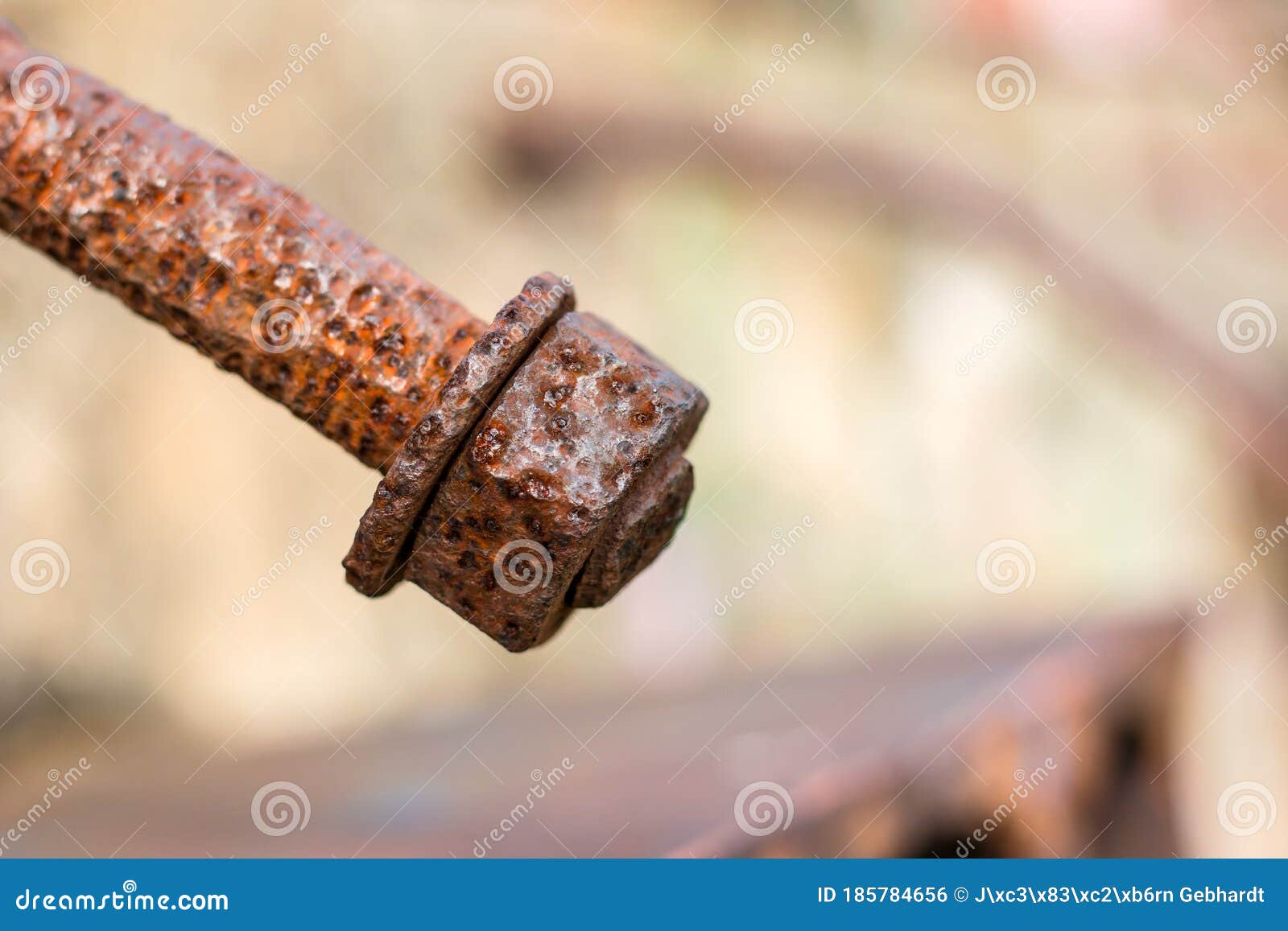 Old, rusty bolt with nut stock photo. Image of danger - 185784656