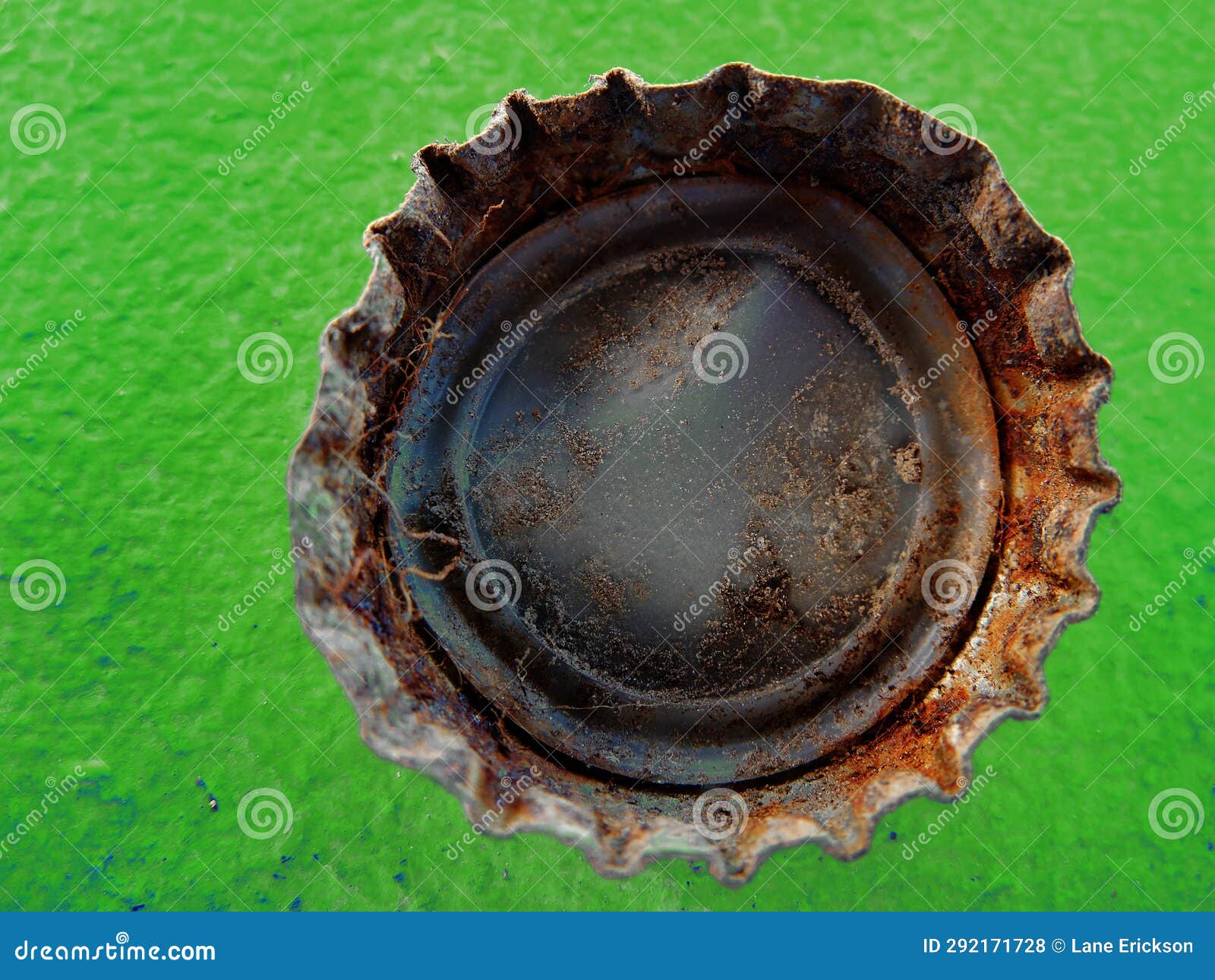 Old Rusty Bottle Cap Bottlecap on Green Background Stock Photo - Image ...