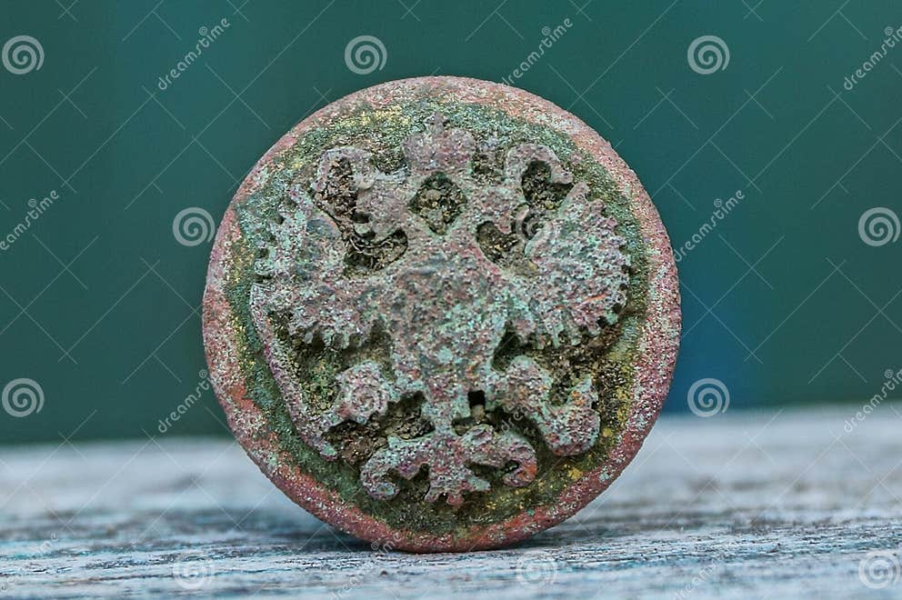 Old Rusty Brown Button with Eagle on Gray Table Stock Photo - Image of ...