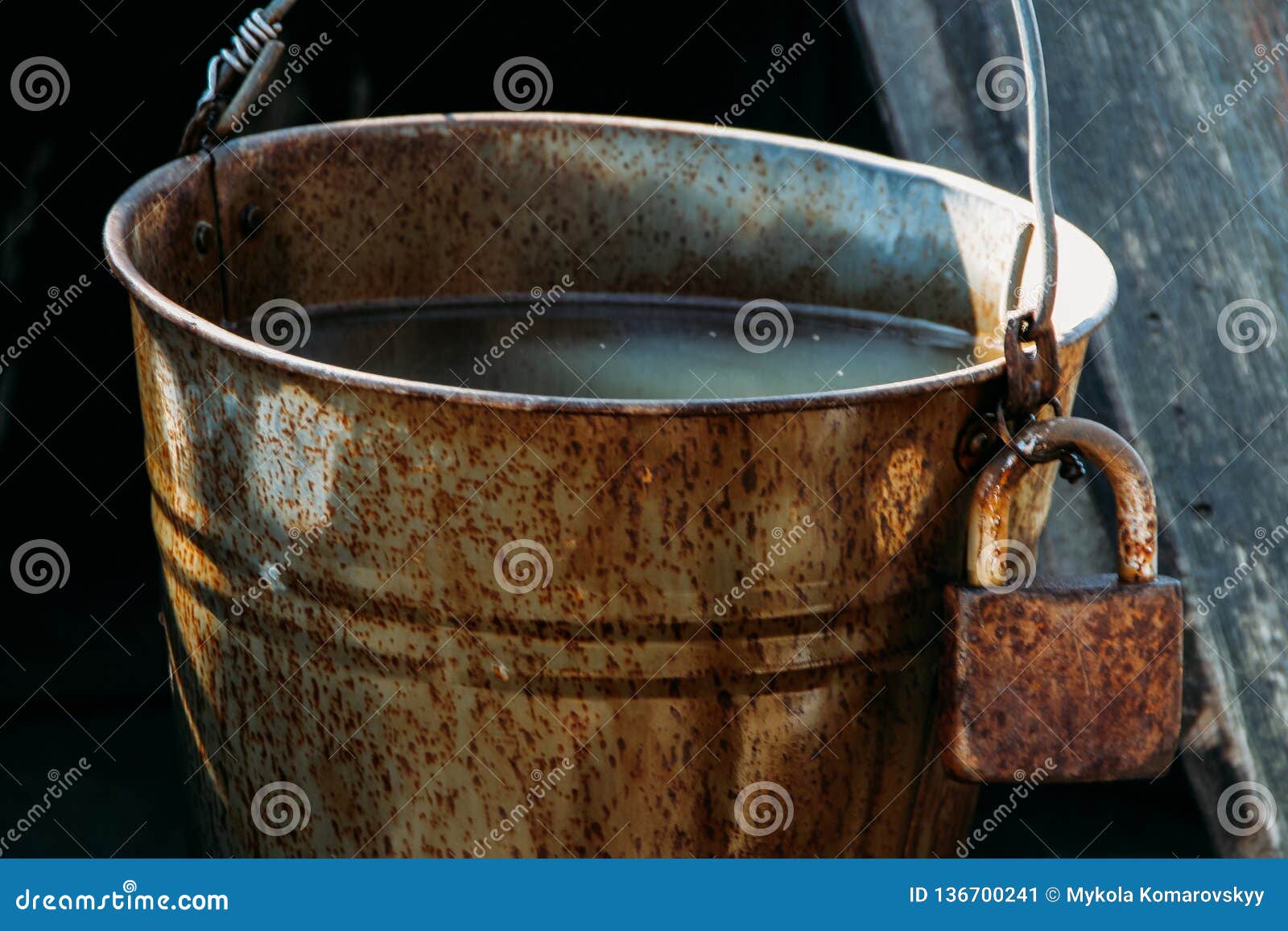 Old rusty bucket stock image. Image of lock, rural, traditional - 136700241