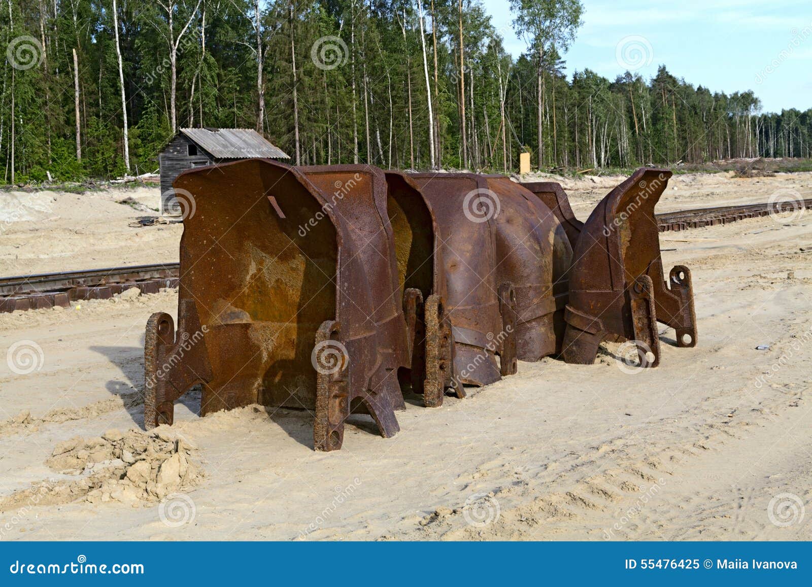 Old Rusty Buckets of Giant Mining Excavators Stock Image - Image of ...