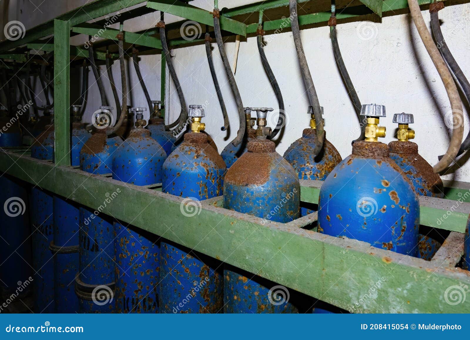 Old Rusty Bundle of Blue Gas Cylinders Stock Photo - Image of methane ...