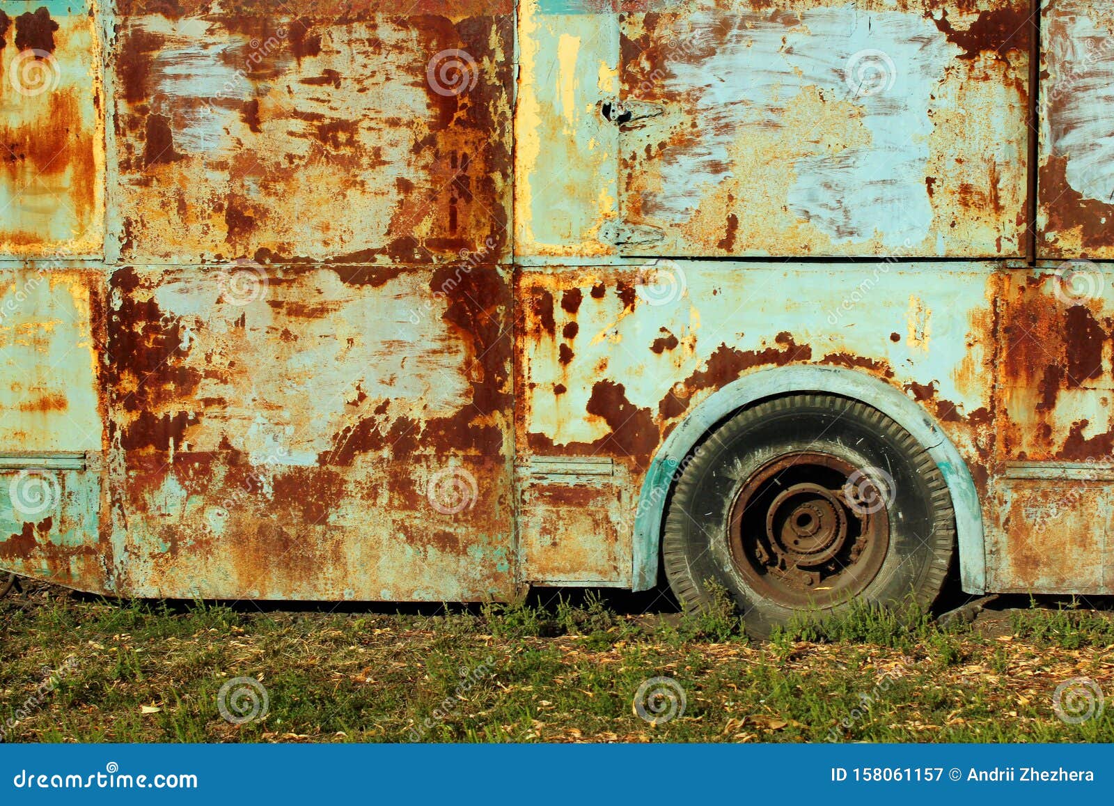 Old Rusty Bus on Green Grass Stock Image - Image of carcass, flaking ...