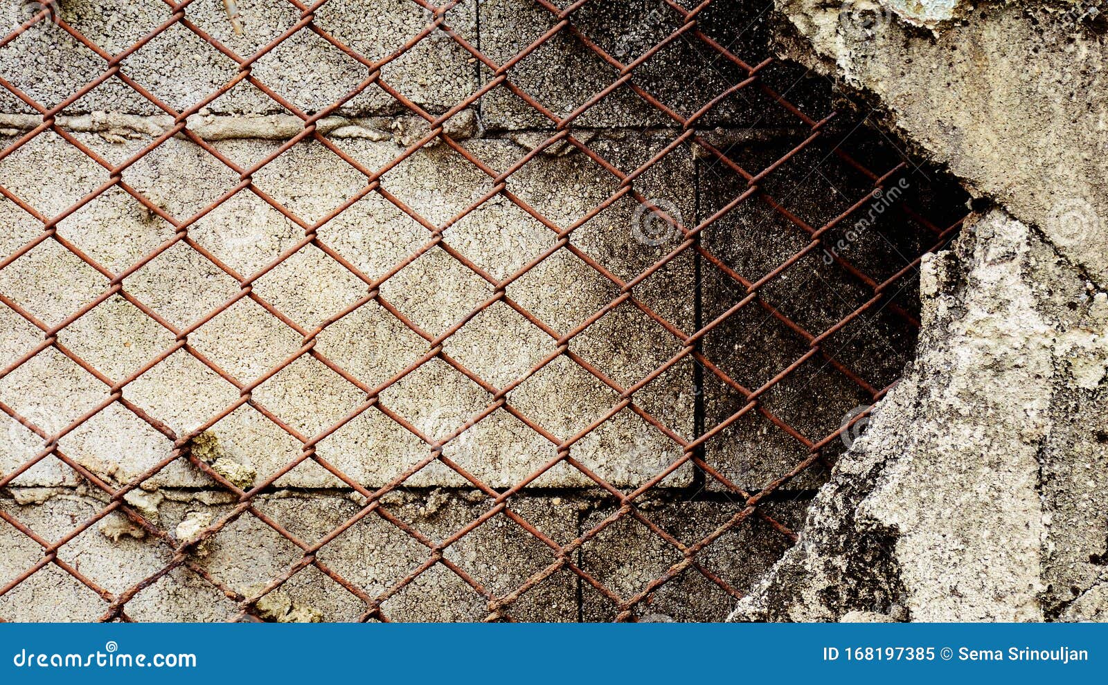 Old Rusty Cage at the Damage Concrete Wall Stock Image - Image of ...