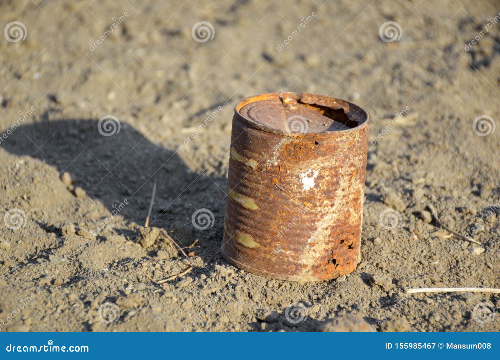 Old Rusty Can on the Ground Stock Image - Image of rusty, steel: 155985467