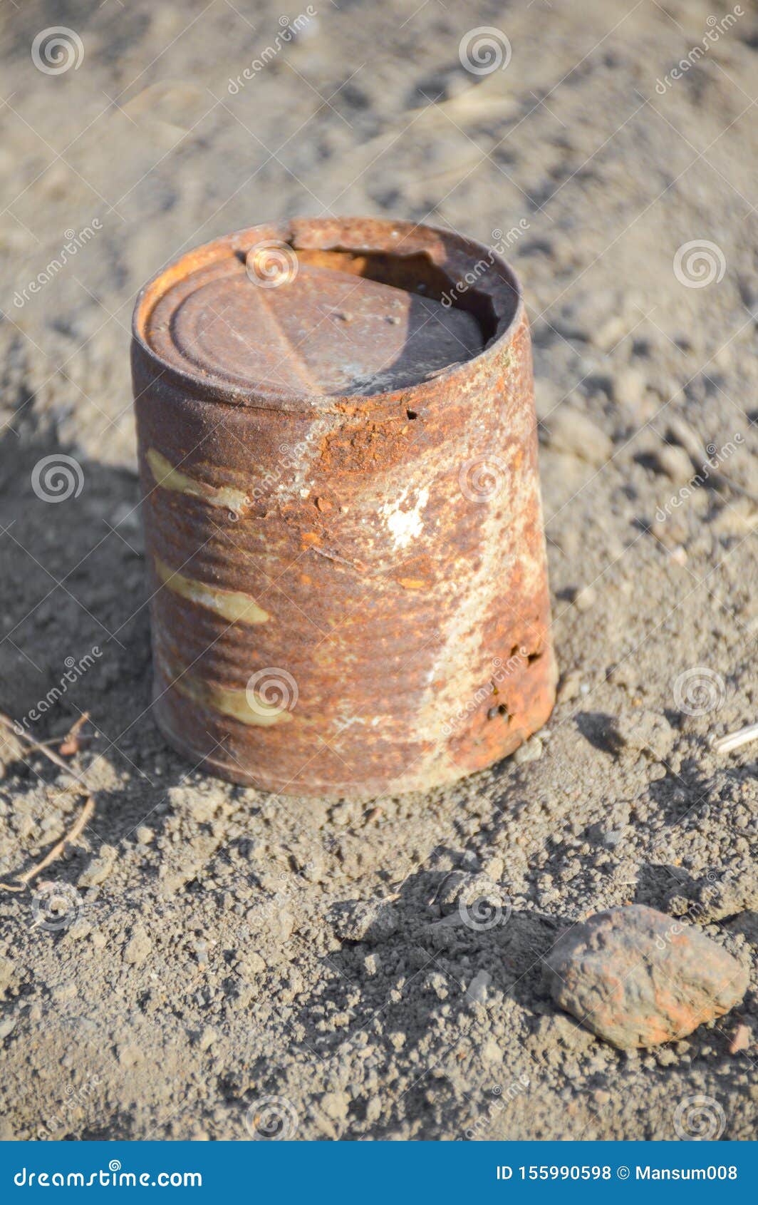 Old Rusty Can on the Ground Stock Photo - Image of disposable, brown ...