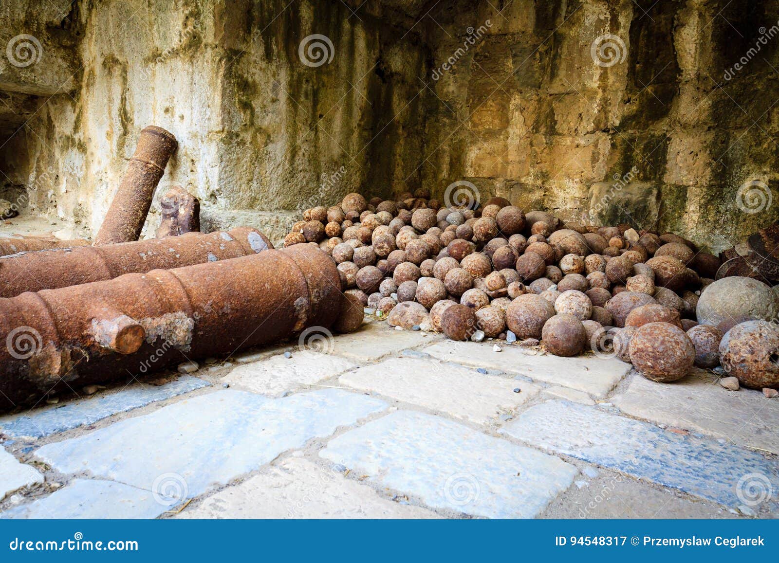 Old rusty cannons stock image. Image of cannonballs, medieval - 94548317