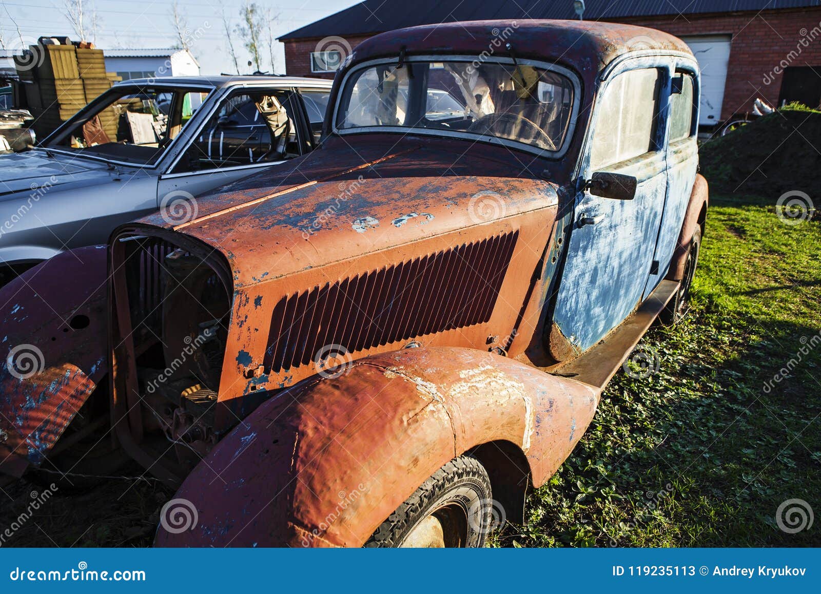 An Old Rusty Car in a Car Dump. Stock Image - Image of destroyed ...