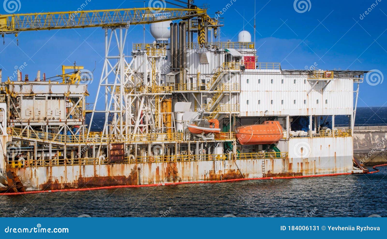 Old Rusty Cargo Tansportration Docks with Crane in the Sea Port Stock ...