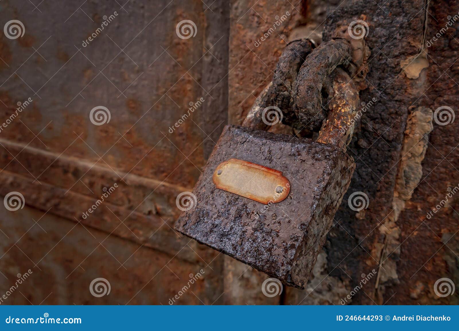 Old Rusty Castle On The Forged Gates Of The Old Fence Stock Image ...