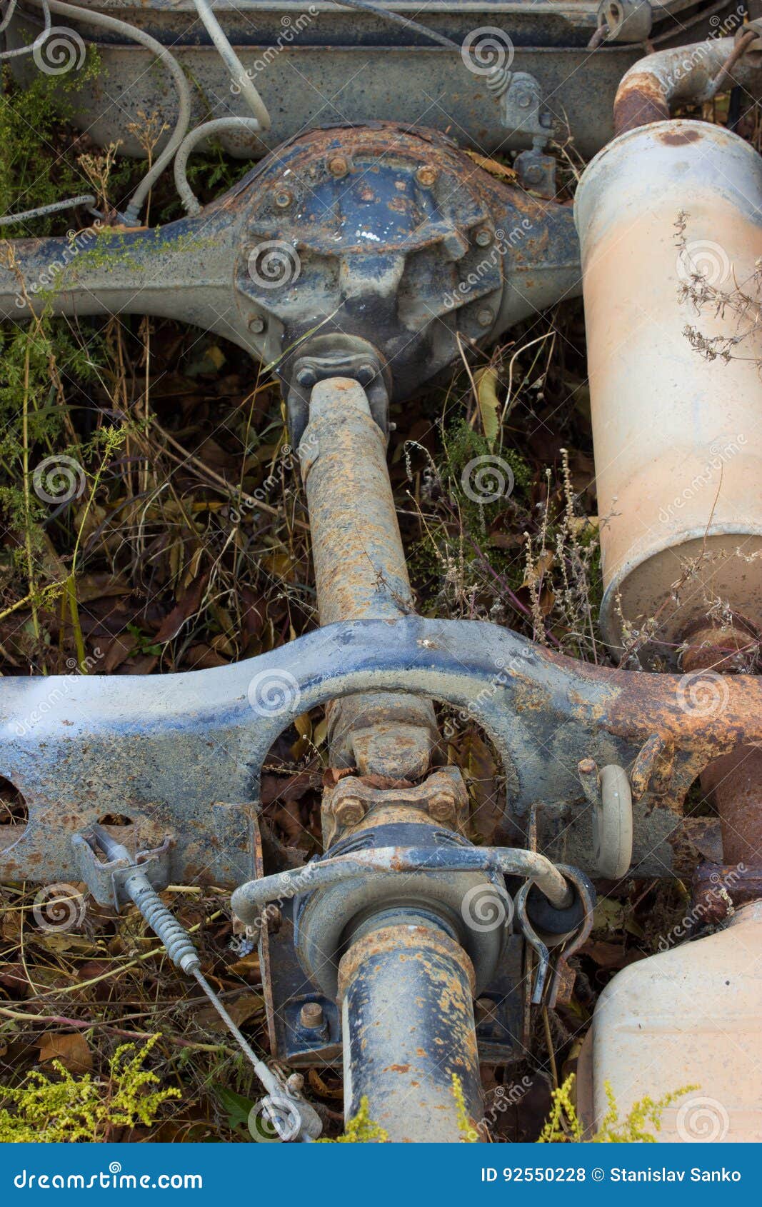 Rusty Chassis Of A Burnt Car Abandoned By The Side Of The Street ...
