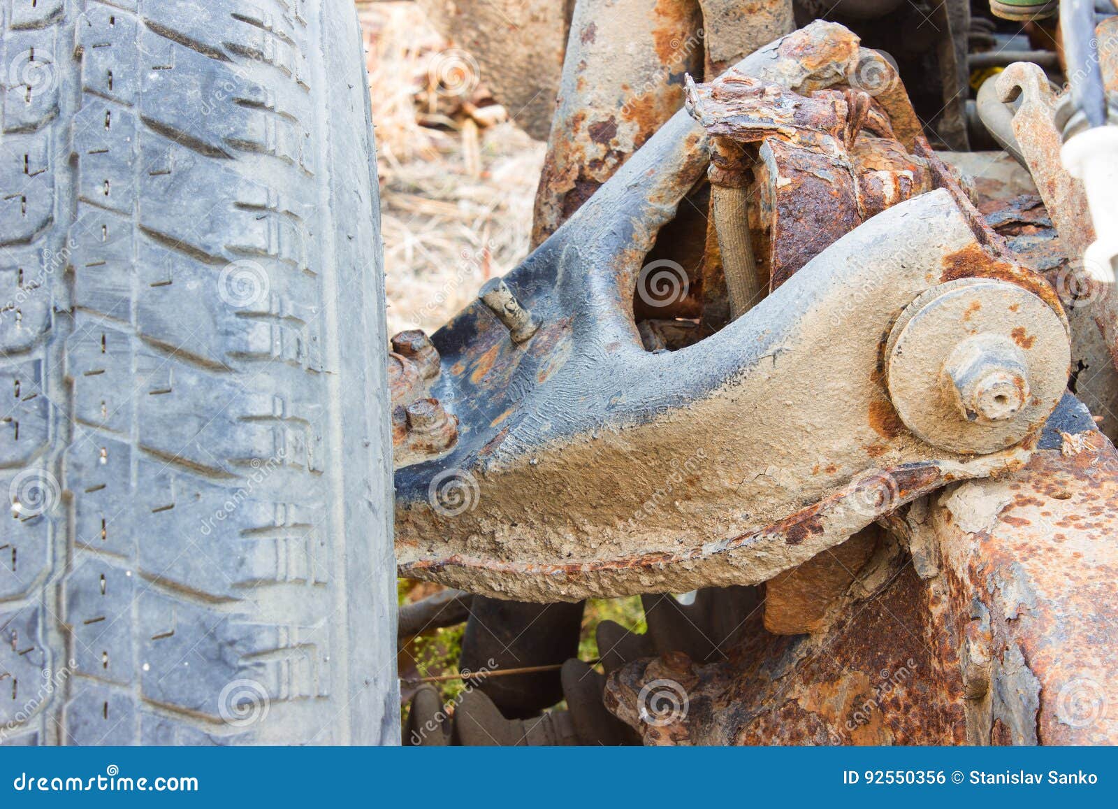 Rusty Chassis Of A Burnt Car Abandoned By The Side Of The Street ...