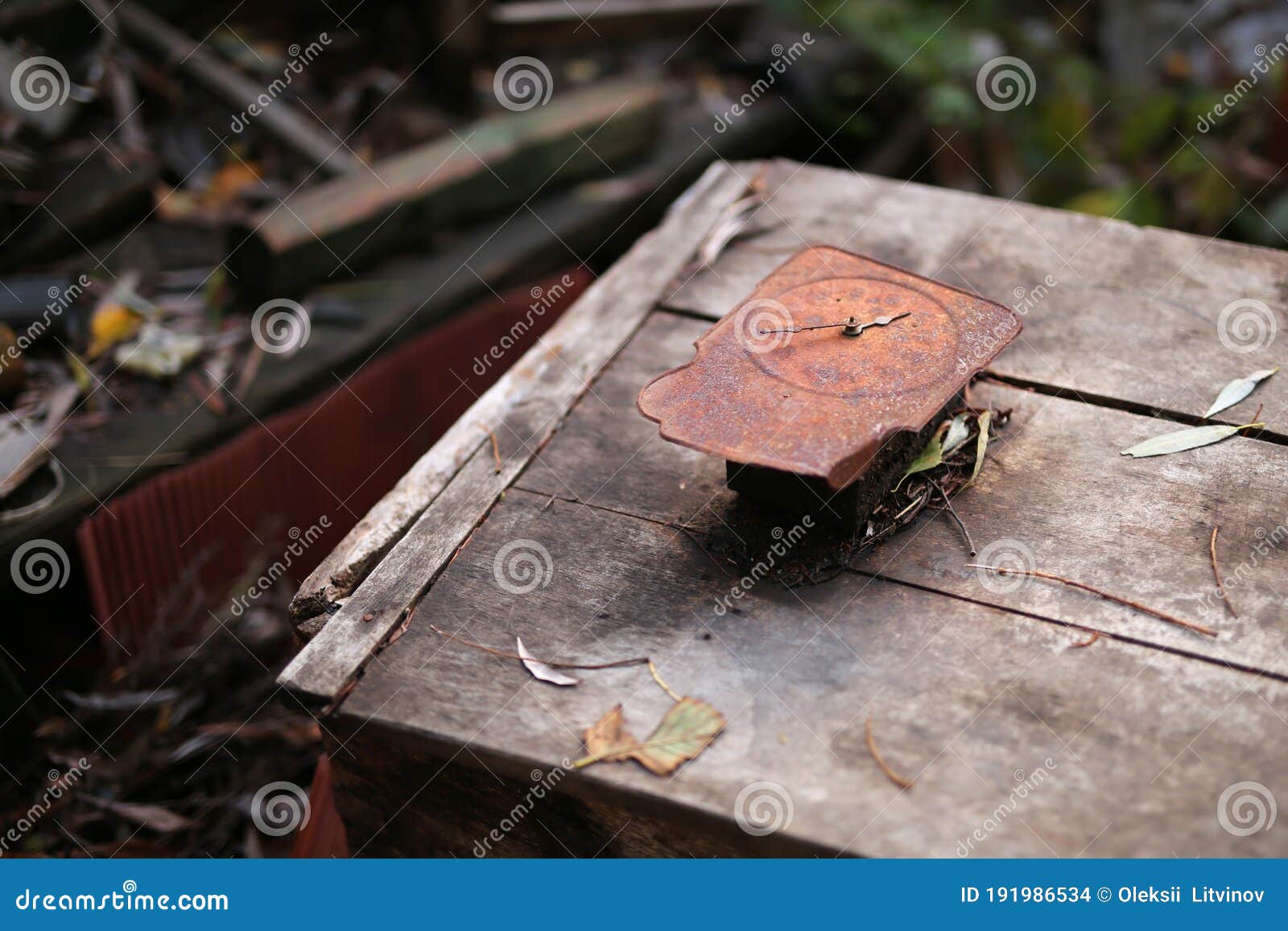 Old Rusty Clock on a Wooden Table among the Ruins of a Destroyed House ...
