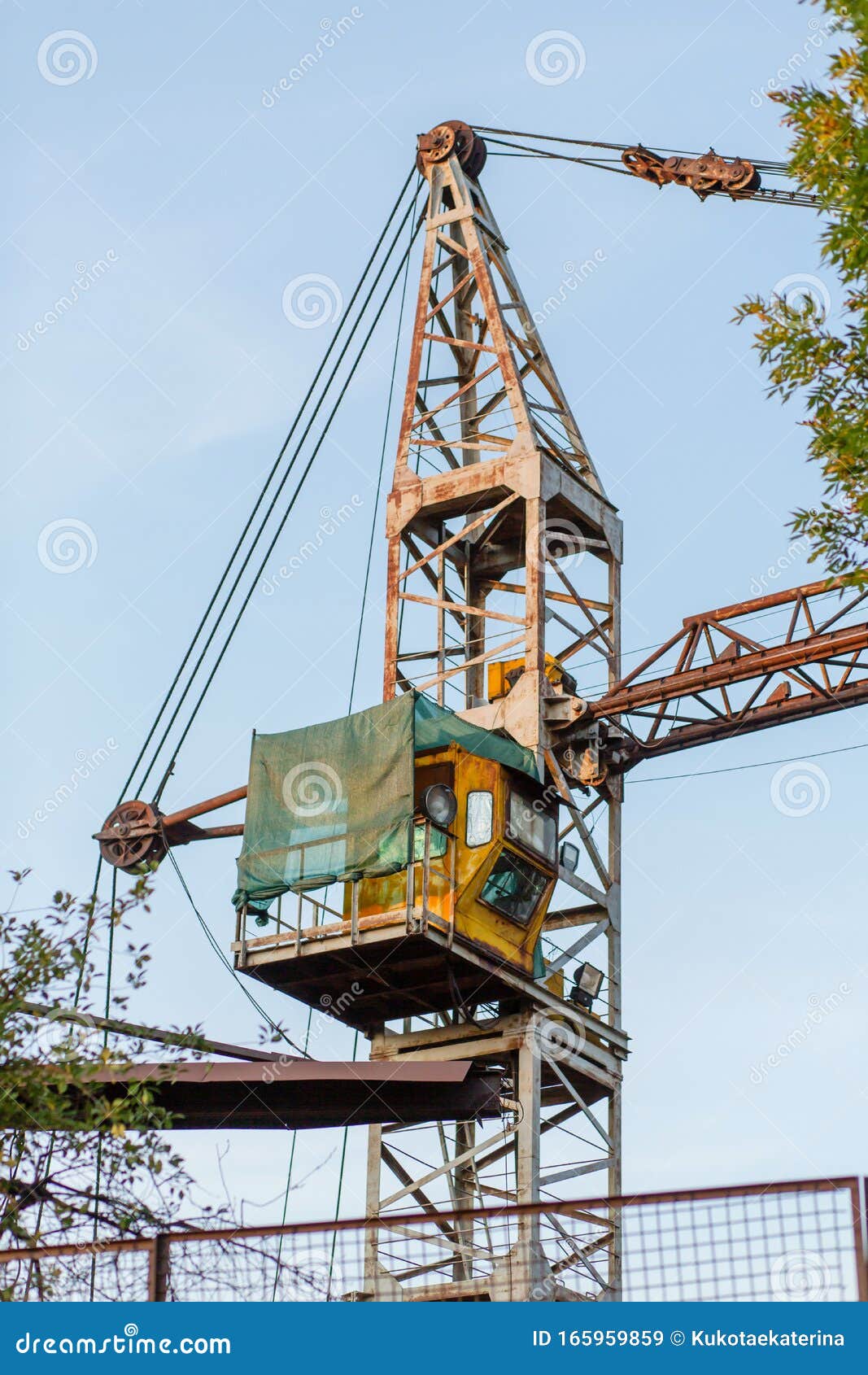 Old Rusty Construction Crane at a Construction Site Stock Image - Image ...