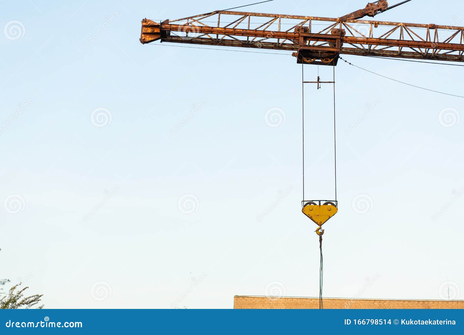 Old Rusty Construction Crane at a Construction Site Stock Photo - Image ...