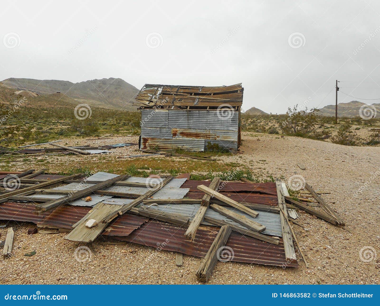 An Old Rusty Corrugated Iron Hut in the Prairie Stock Photo - Image of ...