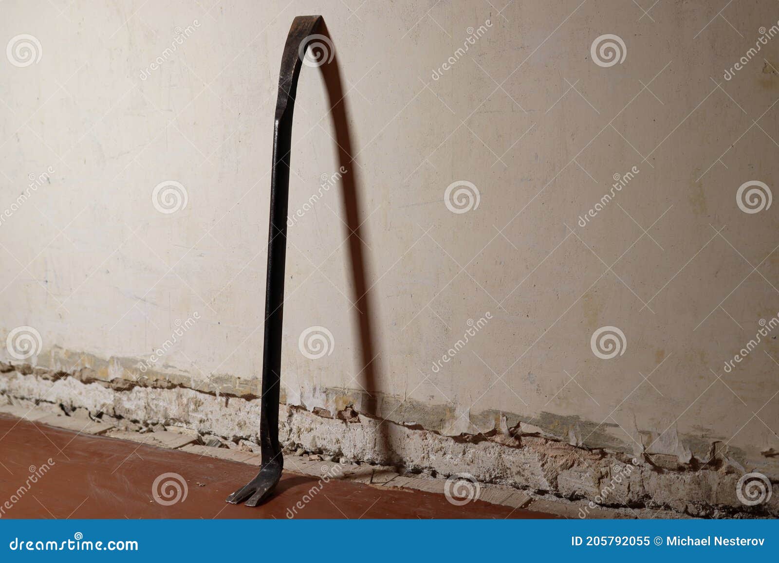 The Old Rusty Crowbar Against a Plastered Wall Stock Image - Image of ...