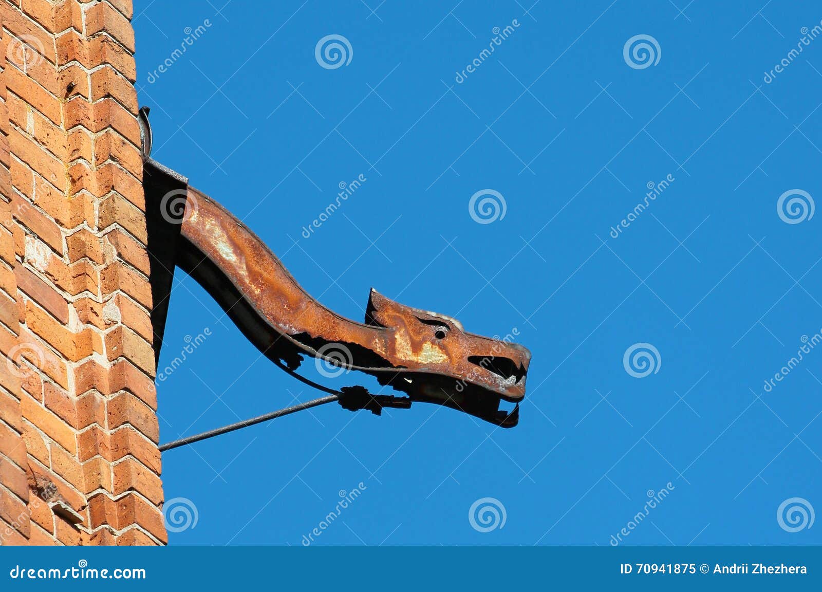 Old Rusty Decorative Gutter Against Blue Sky Background. Stock Image ...