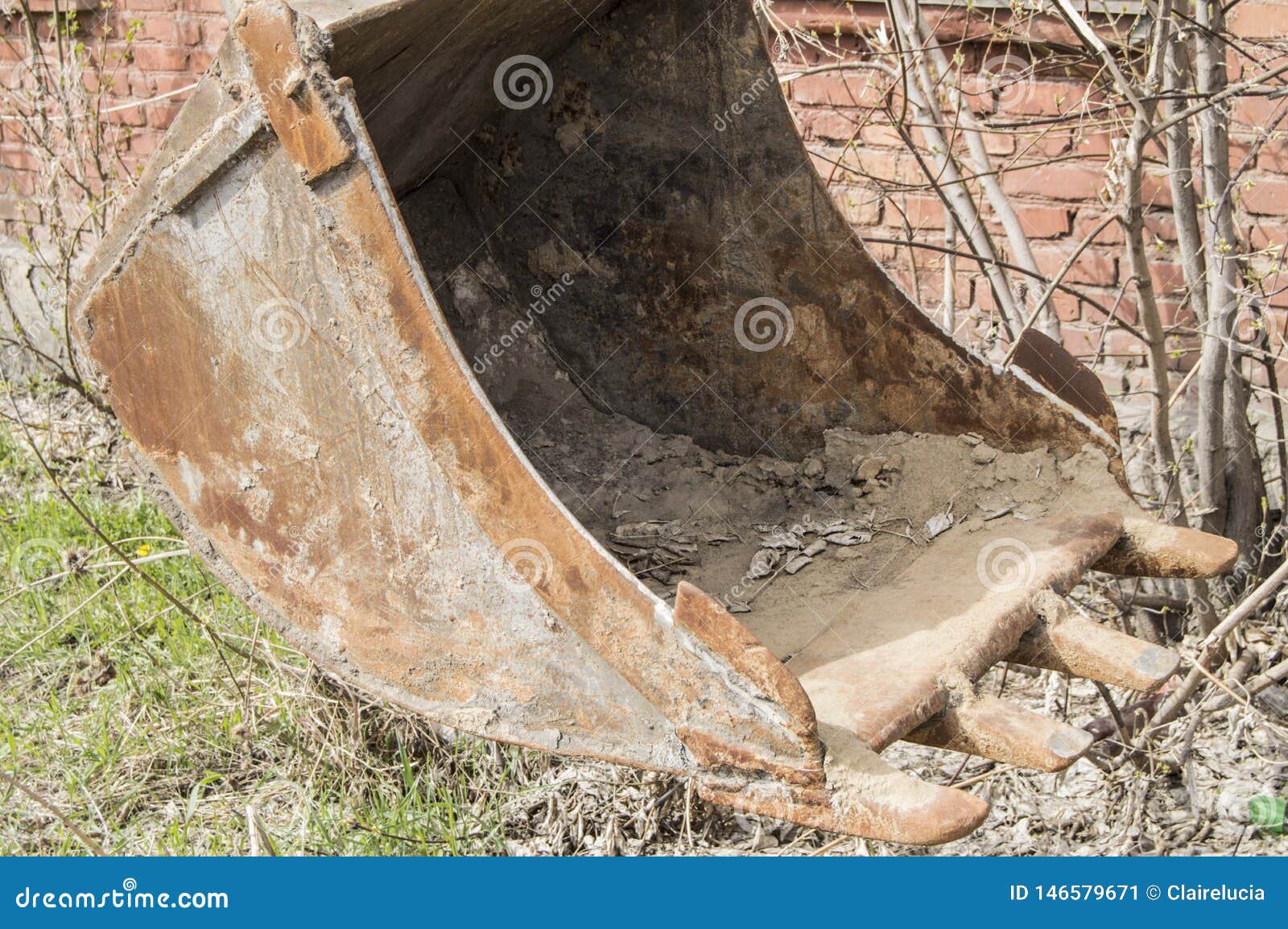Old, Rusty and Dirty Excavator Bucket Closeup on Brick Wall Background ...