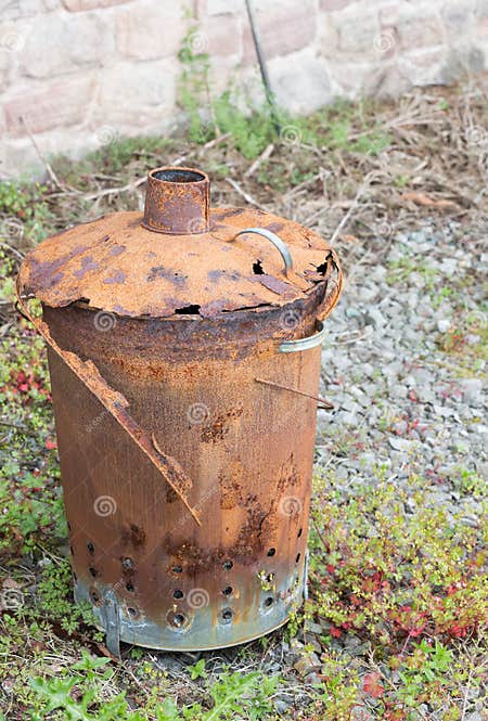 Old Rusty Dustbin Incinerator Stock Photo - Image of combustion, garden ...
