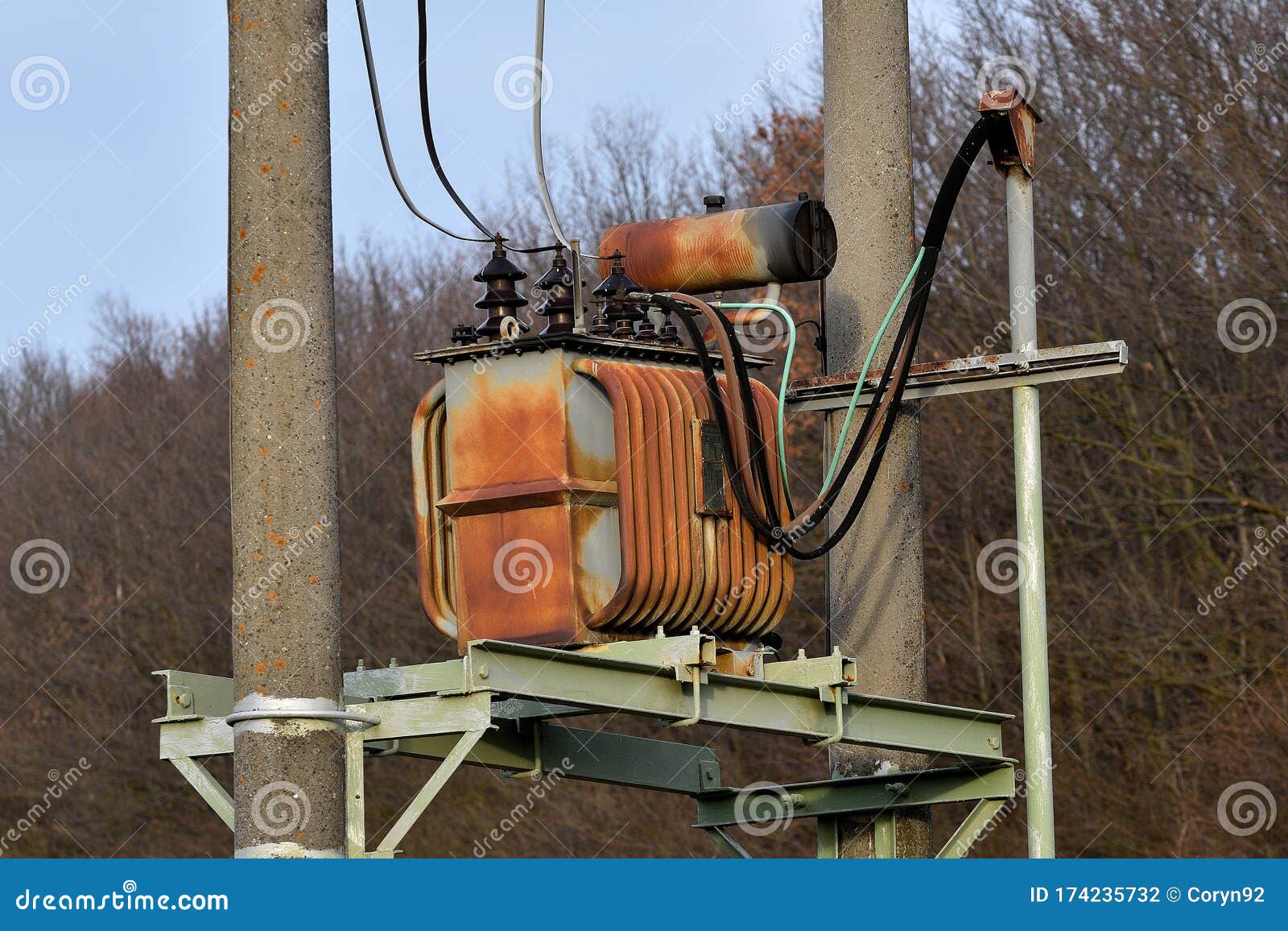 Old Rusty Electric Transformer on Two Concrette Pille, Electric Site ...