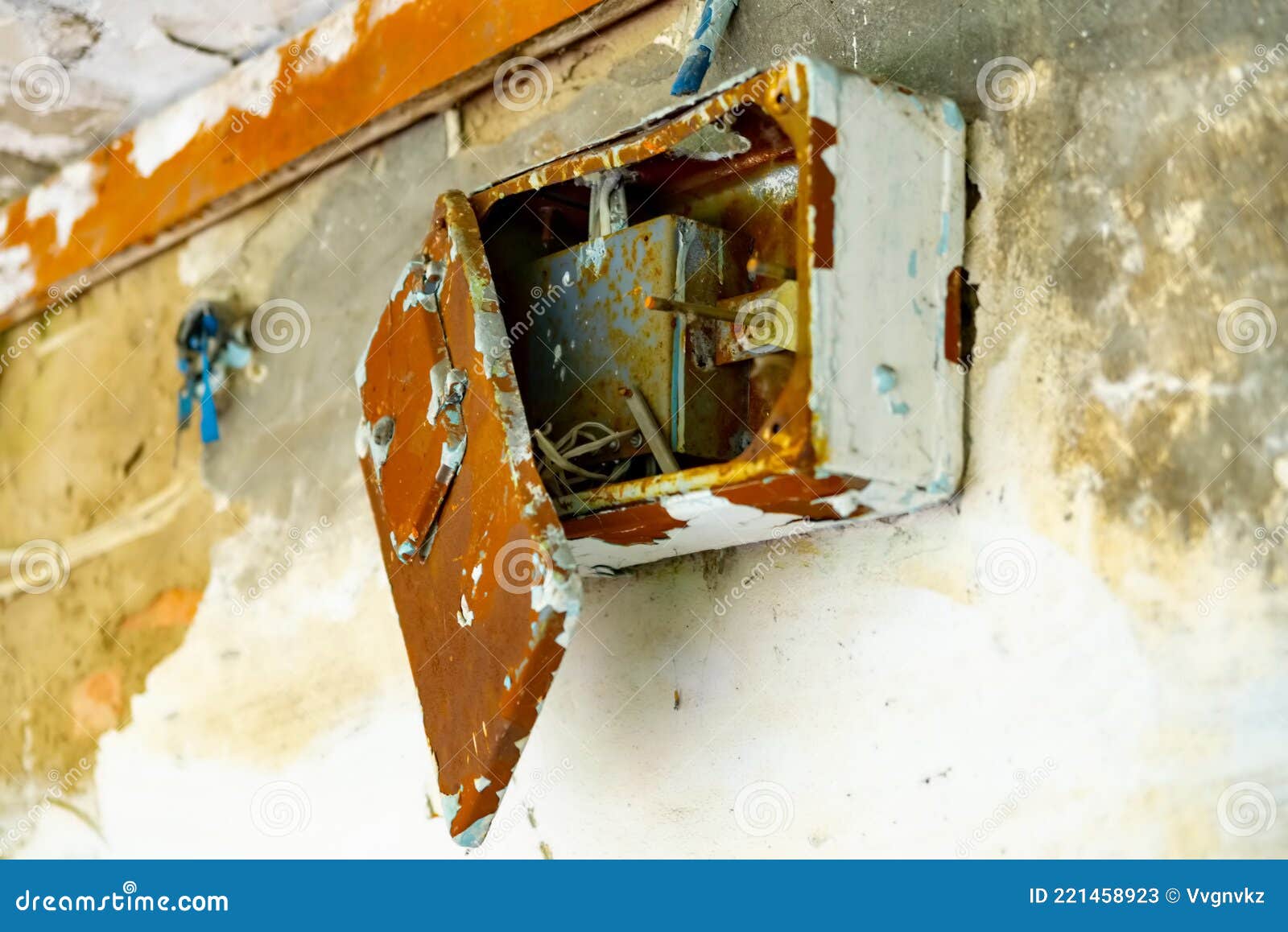 An Old Rusty Electrical Panel on the Wall of the House. a Panel on the ...