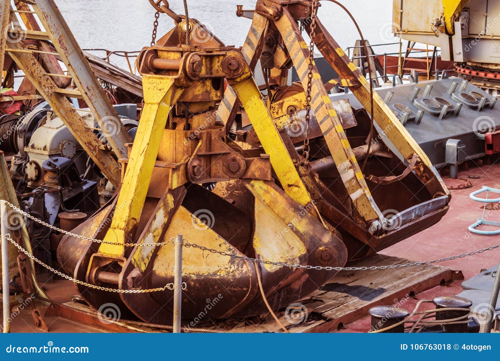 Old Rusty Excavator Bucket Lying on the Deck of a River Ship Stock ...