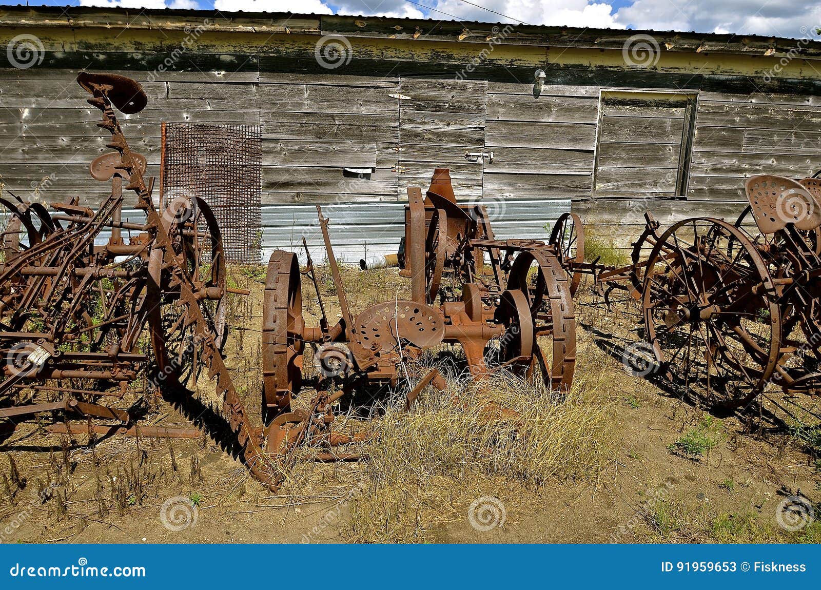 Old rusty farm equipment stock image. Image of cultivators - 91959653
