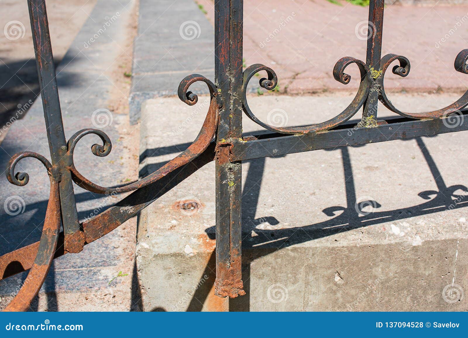 An Old, Rusty Forged Fence With Spikes. The Texture Of A Solid Metal ...