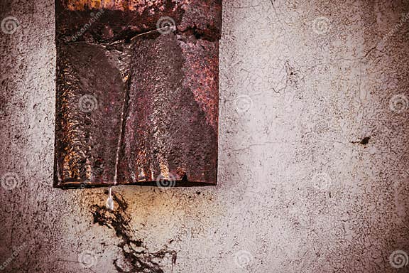 An Old Rusty Gutter Old Pipe Next To a Wall Stock Image - Image of ...