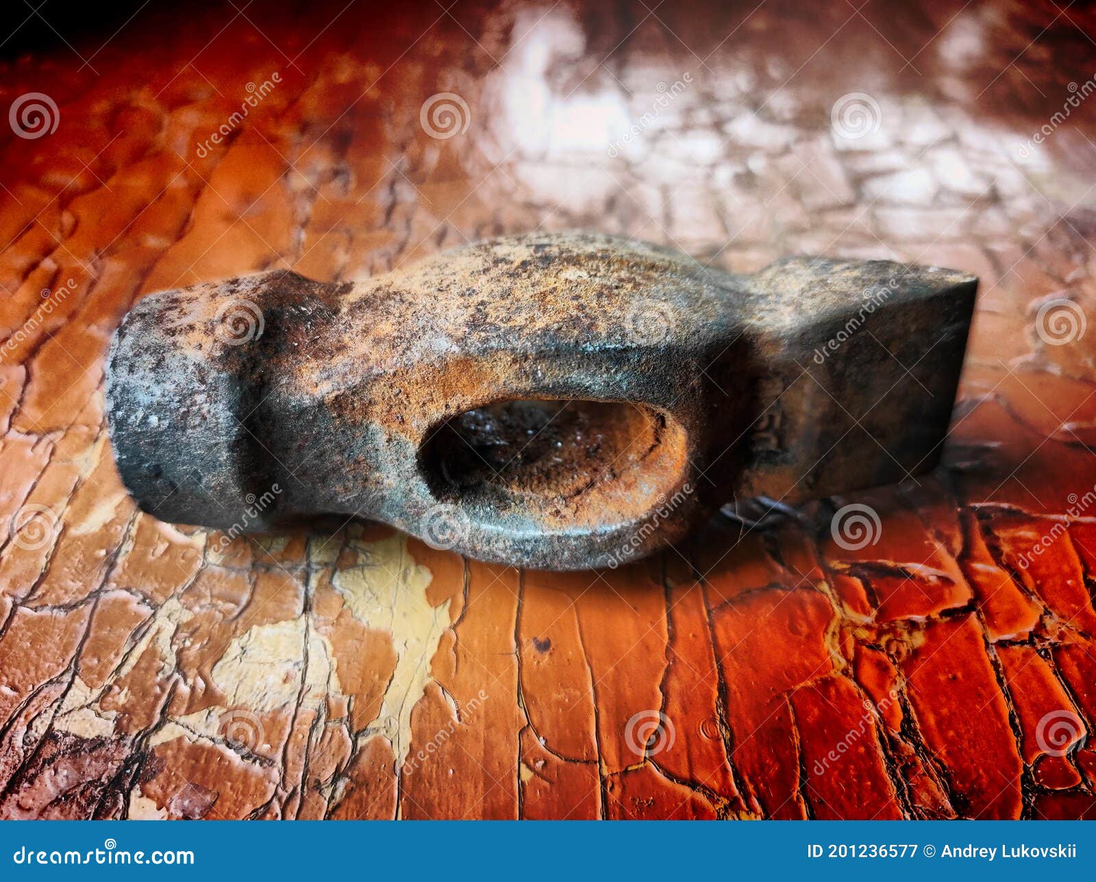 An Old Rusty Hammer Lies on a Rough Orange Surface Stock Image - Image ...