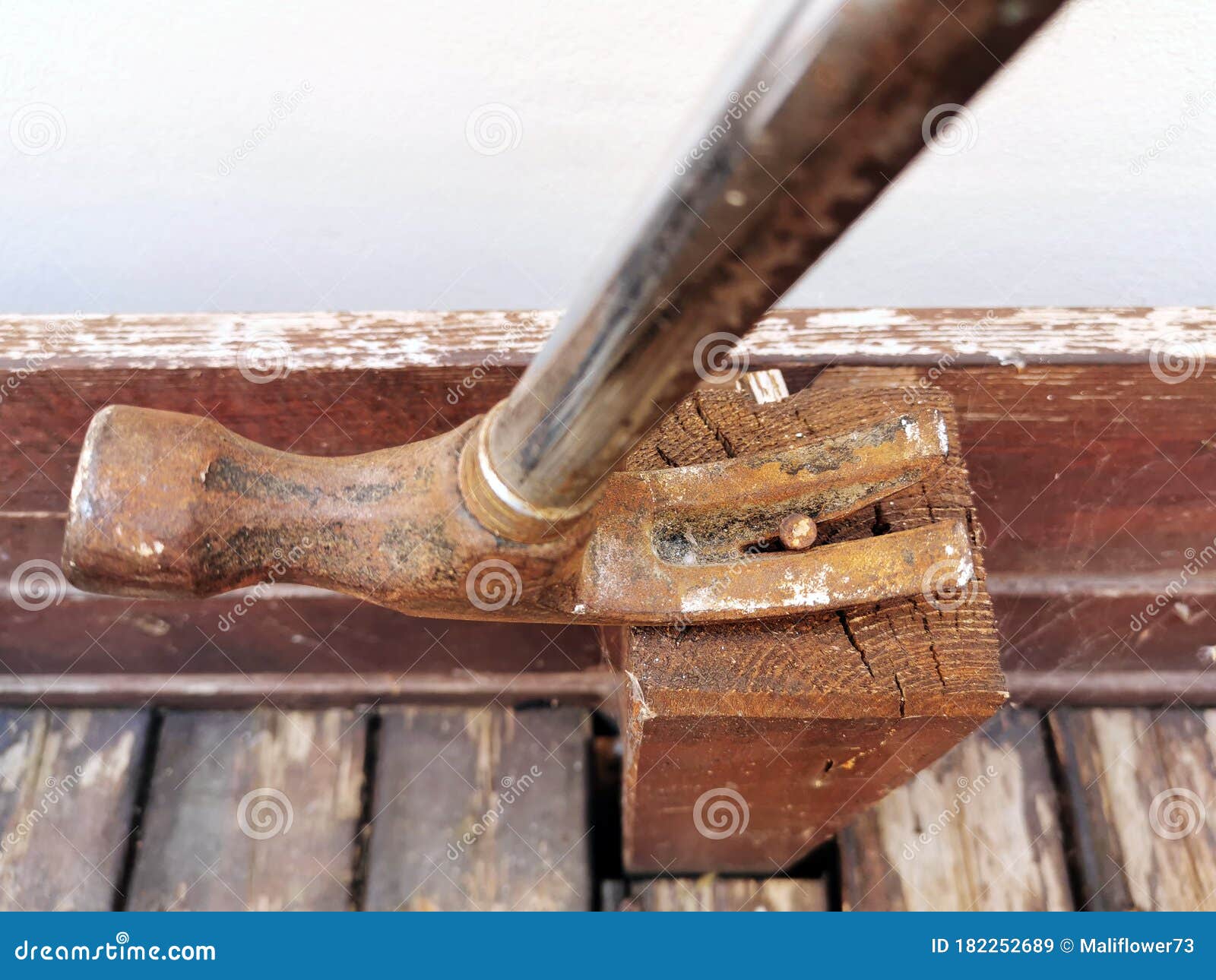 Hammer Pulling Out A Nail Out Of A Piec Royalty-Free Stock Image ...