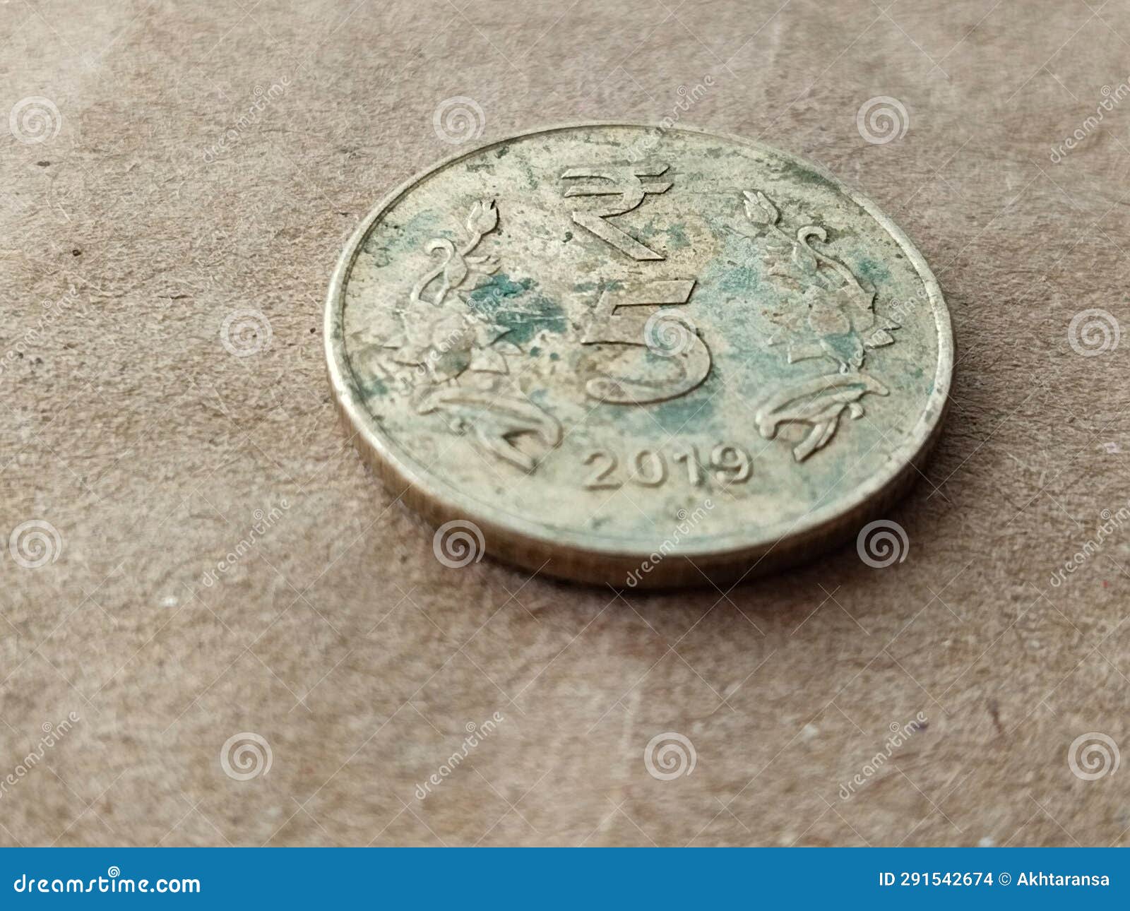 Old Rusty Indian Coin Five Rupees Isolated on Wheatish Background. Copy ...