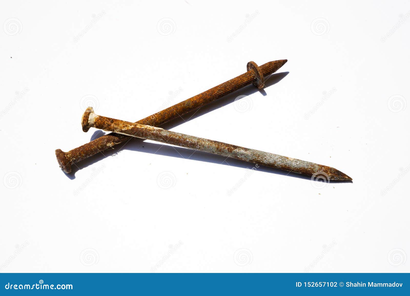 Old Rusty Iron Nails on White Background. Stock Photo - Image of ...