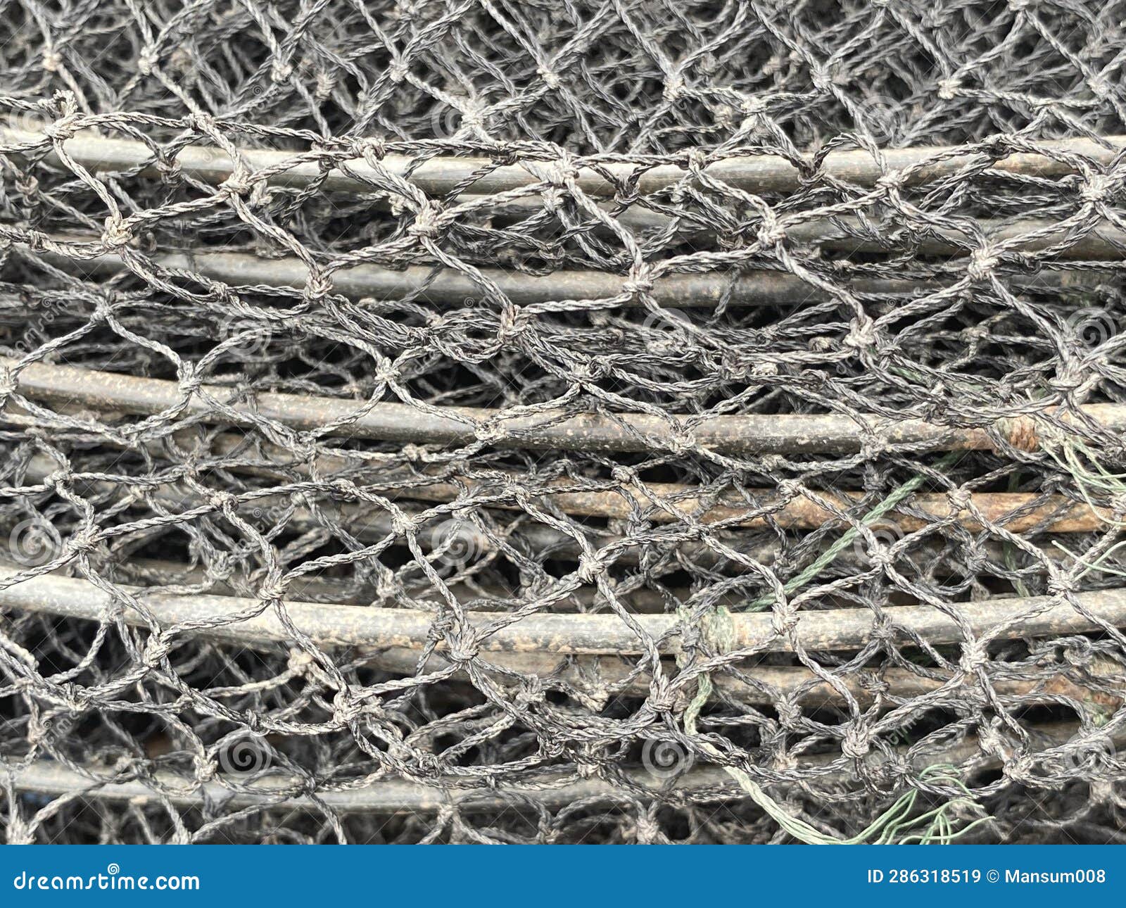 Old rusty iron on the net stock image. Image of abstract - 286318519